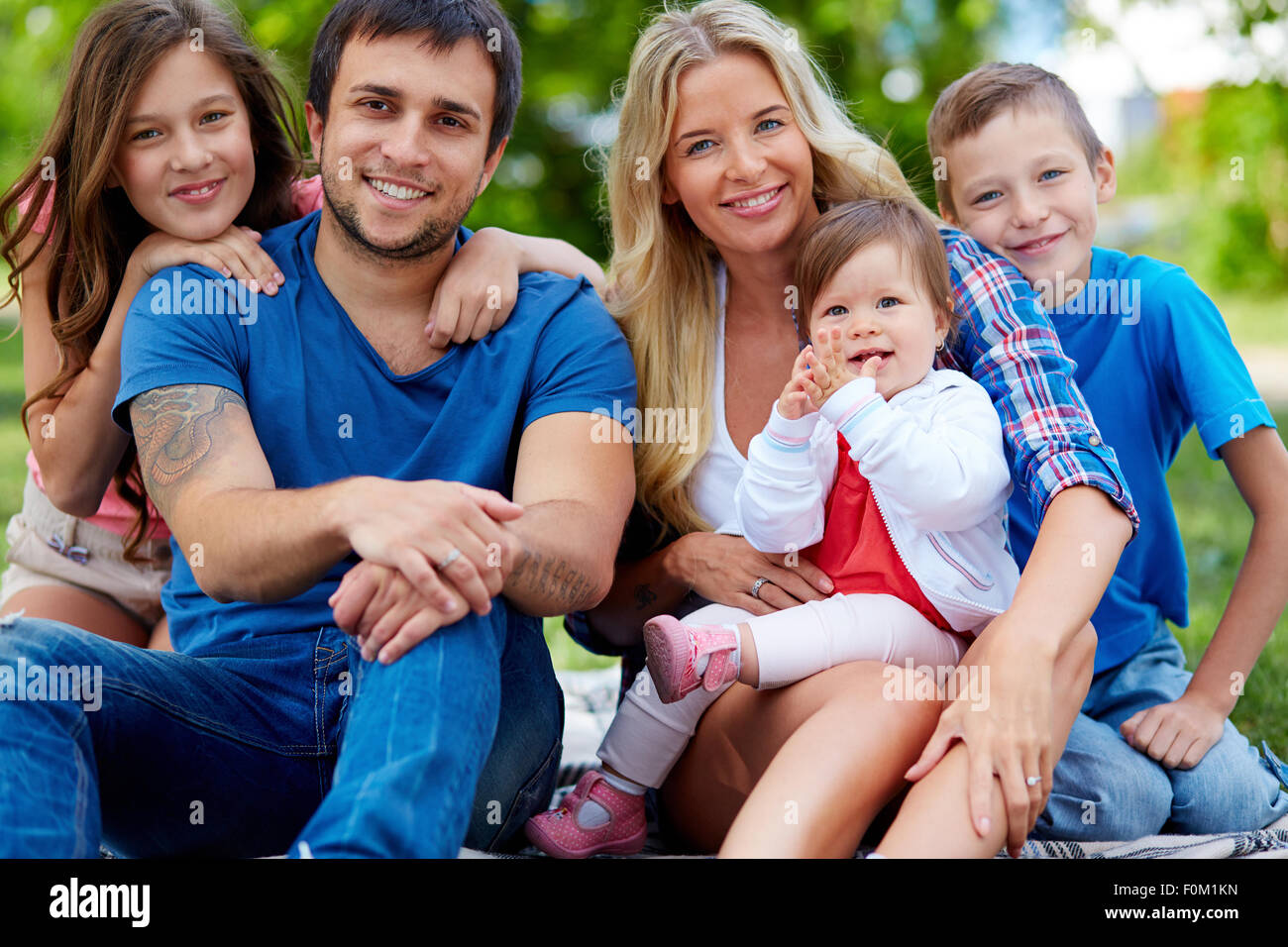 Portrait of happy family with three children Stock Photo - Alamy Portrait of happy family with three children Stock Photo - Alamy