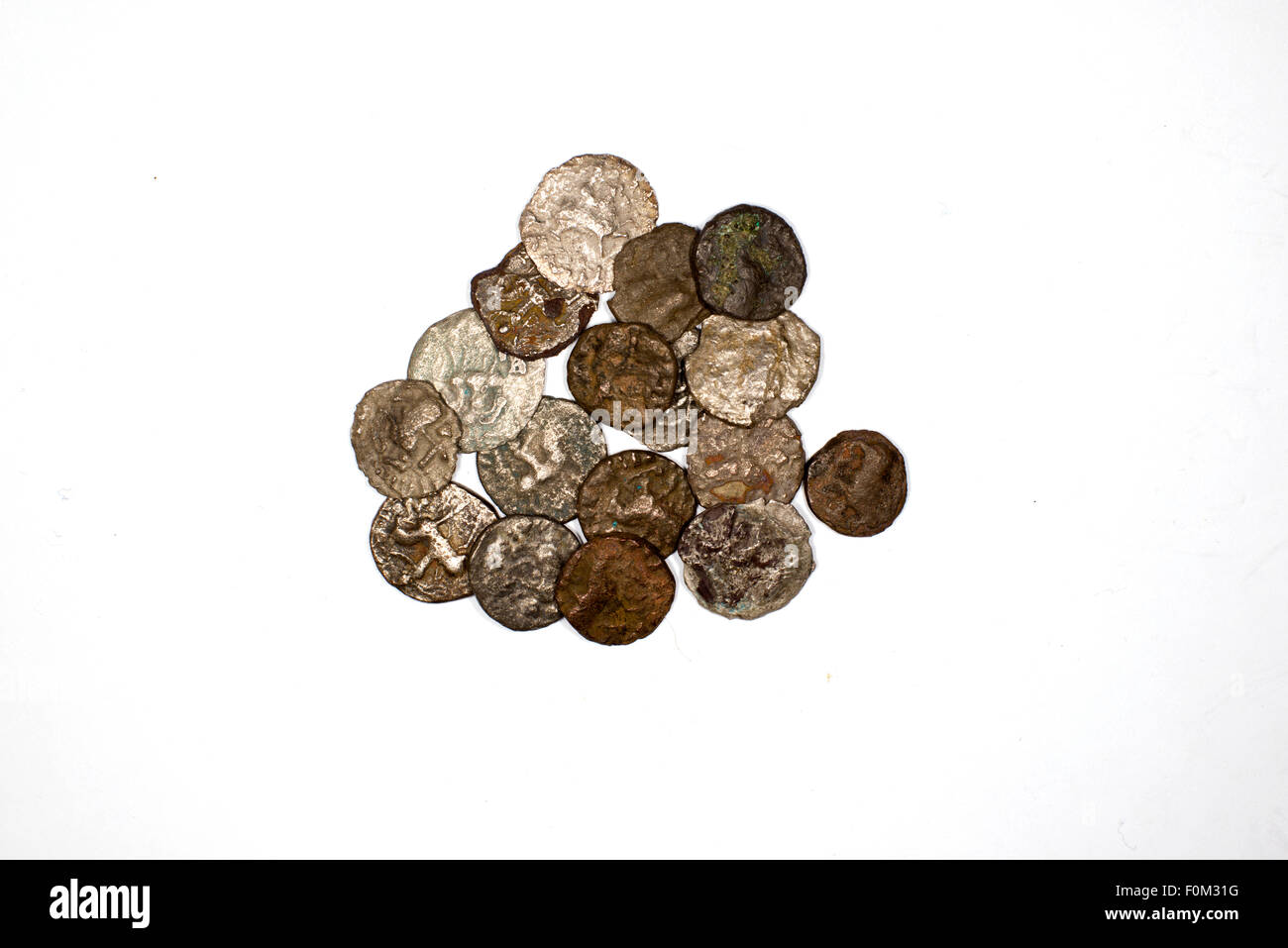 A lot antique bronze Bactrian coins on a white background Stock Photo ...