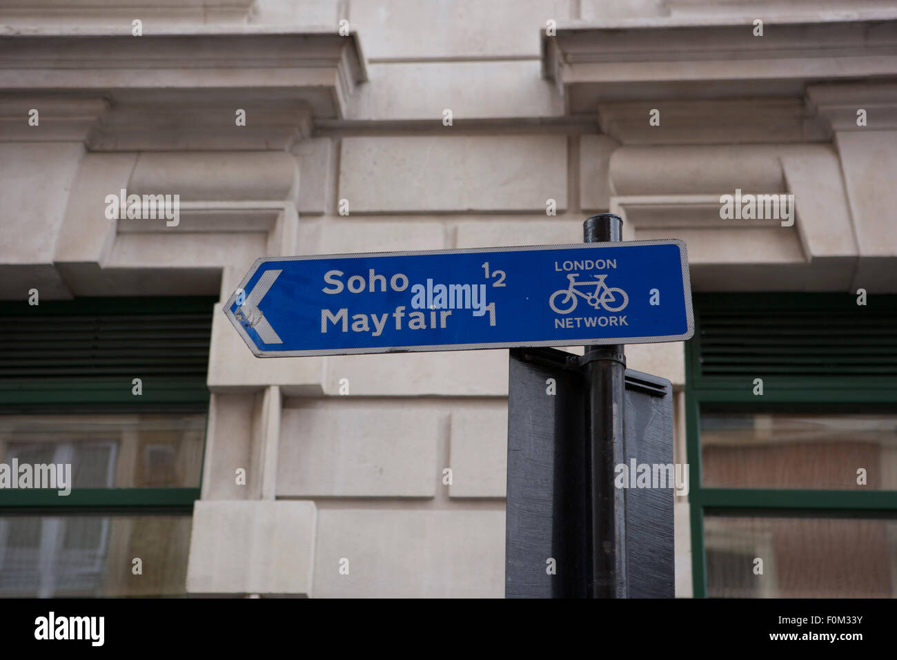 Soho and Mayfair sign for cyclists Stock Photo - Alamy