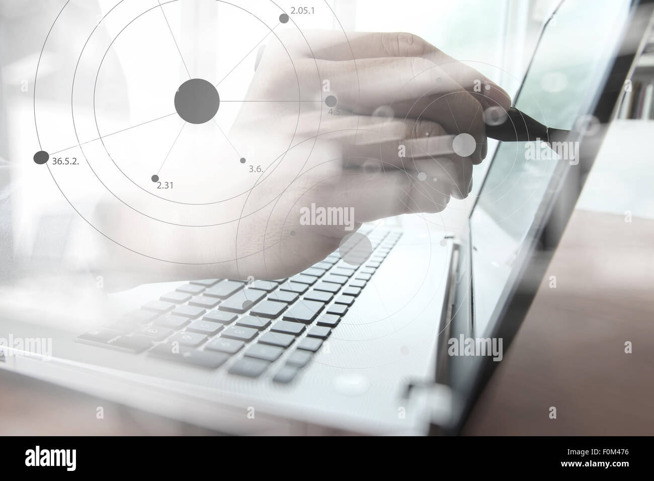 business man hand working with laptop computer and touching on screen ...