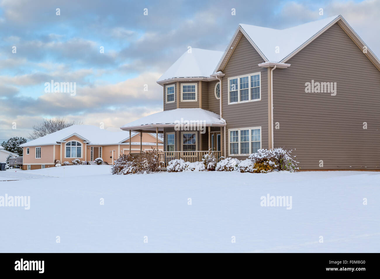 Residential homes in a north American subdivision after a snowfall ...