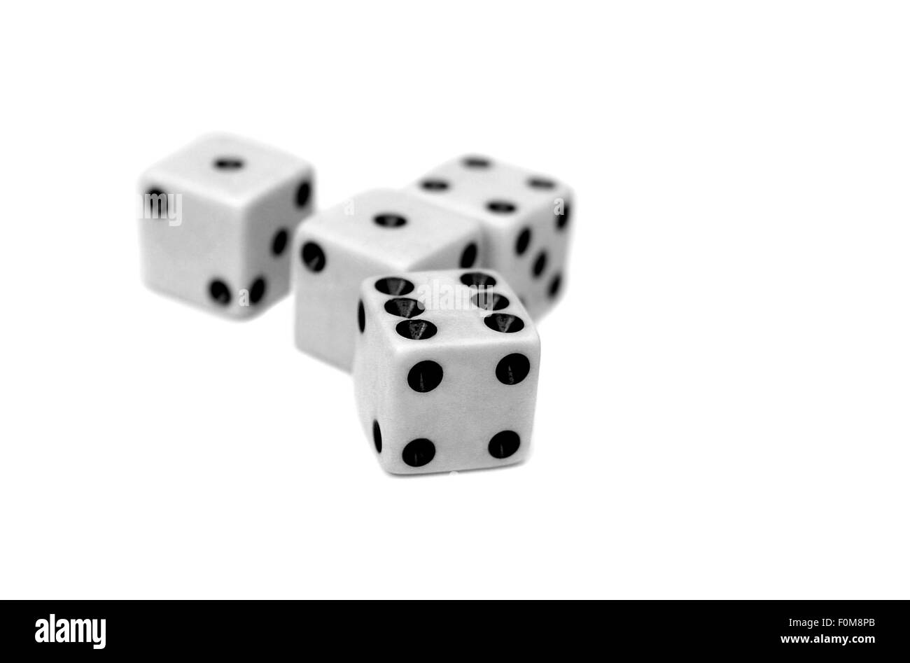 Several dice isolated on a white background Stock Photo - Alamy