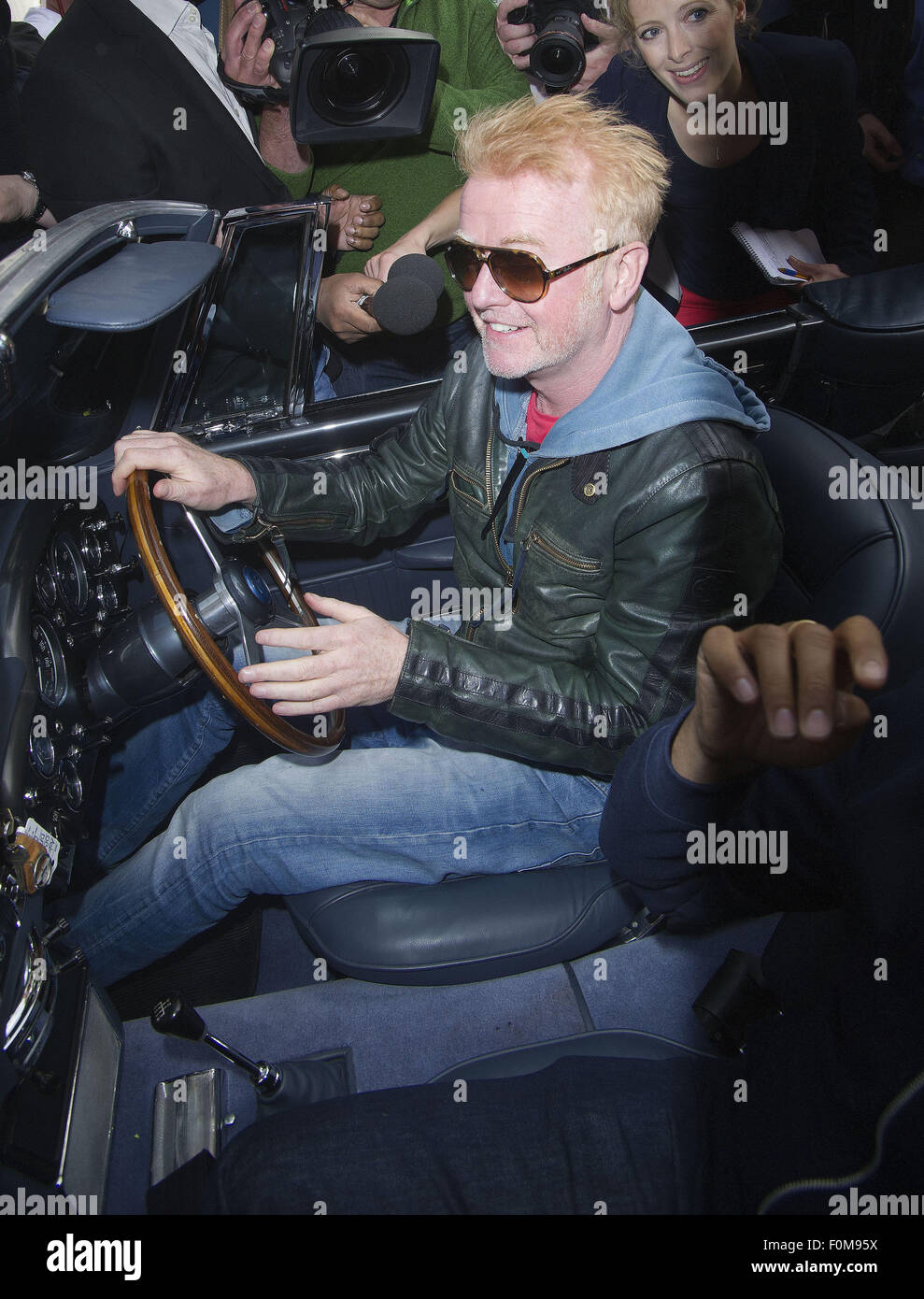 A very smiley Chris Evans leaves the BBC studios to head to Ascot races ...