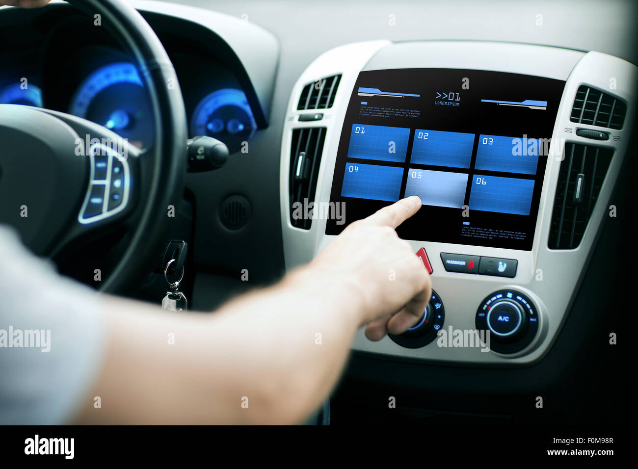 hand pushing button on car control panel screen Stock Photo - Alamy