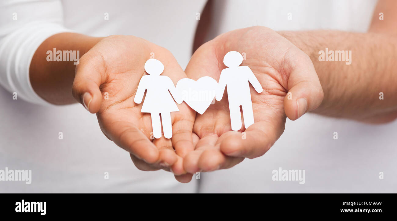 couple hands with paper couple Stock Photo - Alamy
