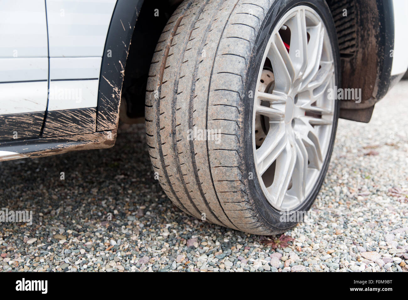 close up of dirty car wheel on ground Stock Photo - Alamy