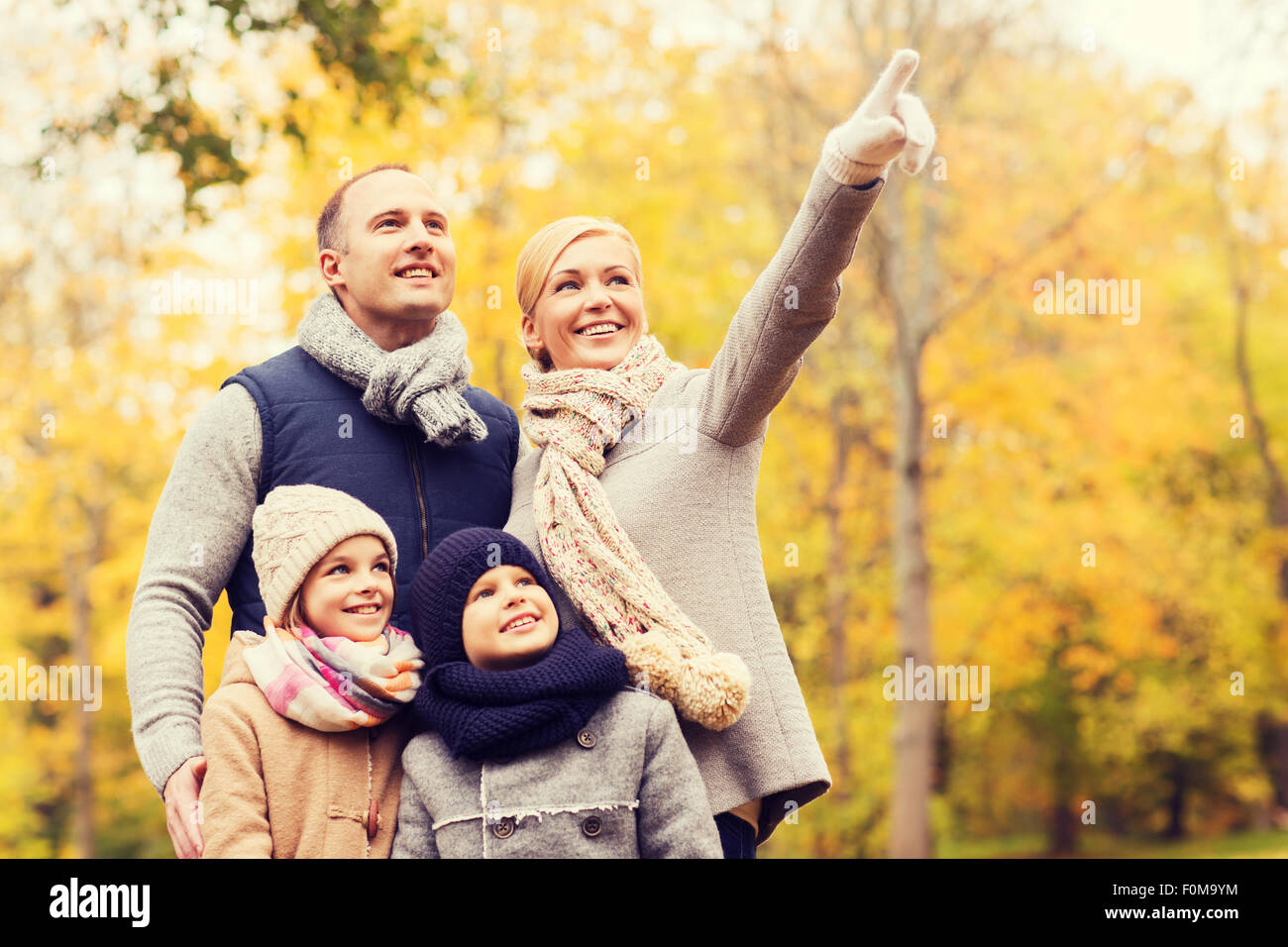 happy family in autumn park Stock Photo - Alamy