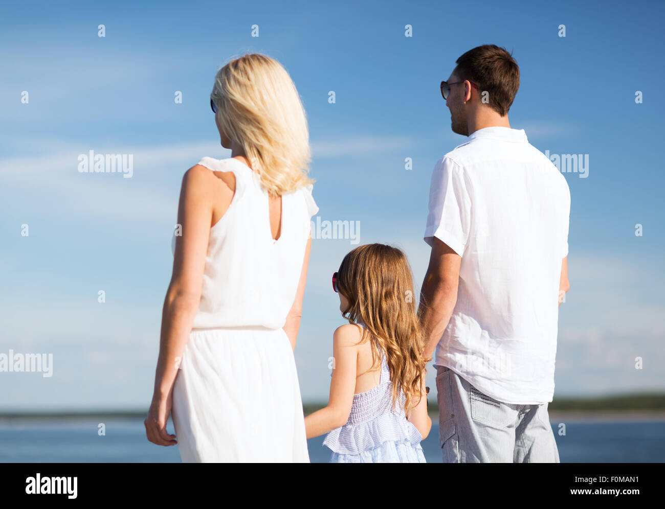 happy family at the seaside Stock Photo - Alamy