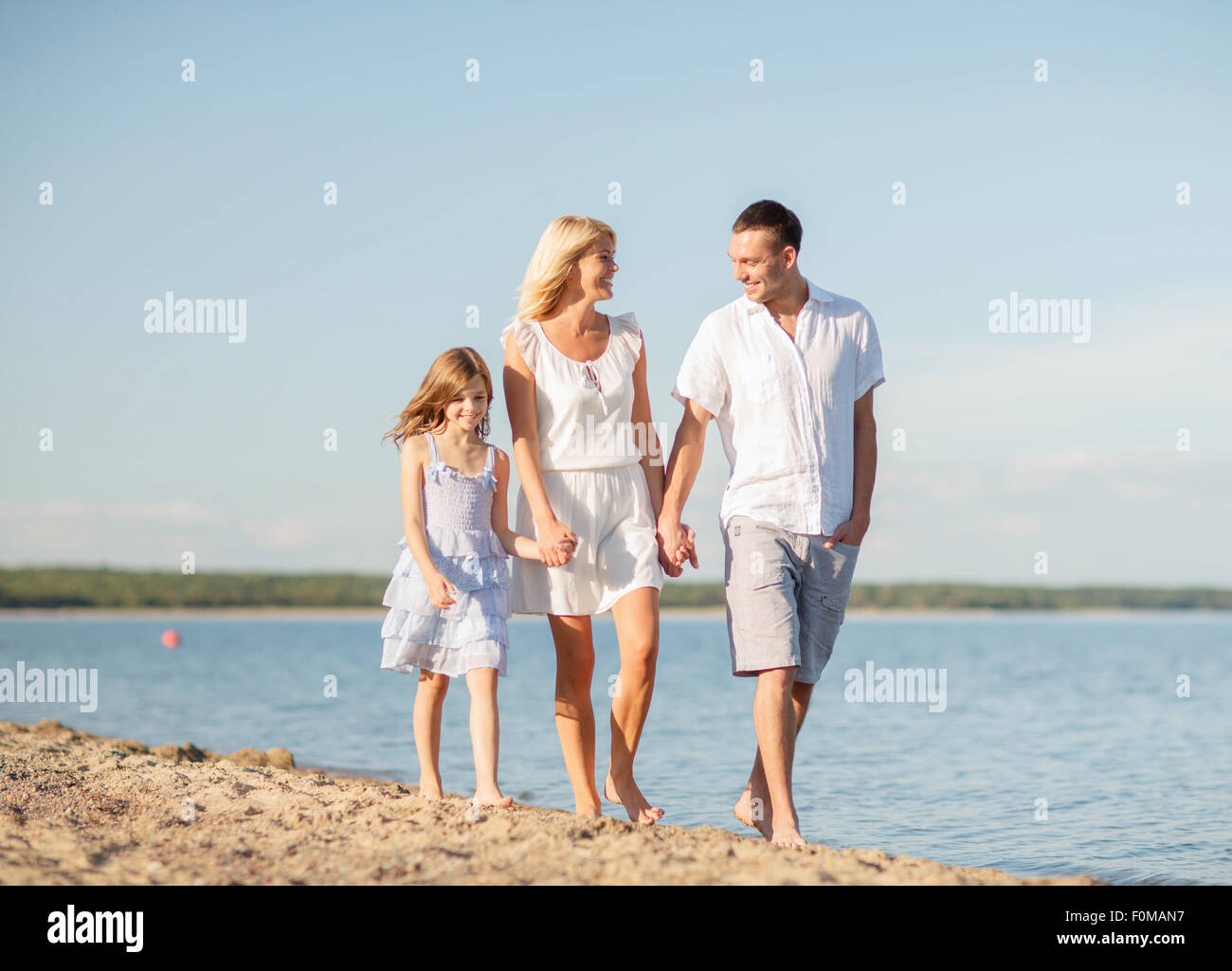 happy family at the seaside Stock Photo - Alamy