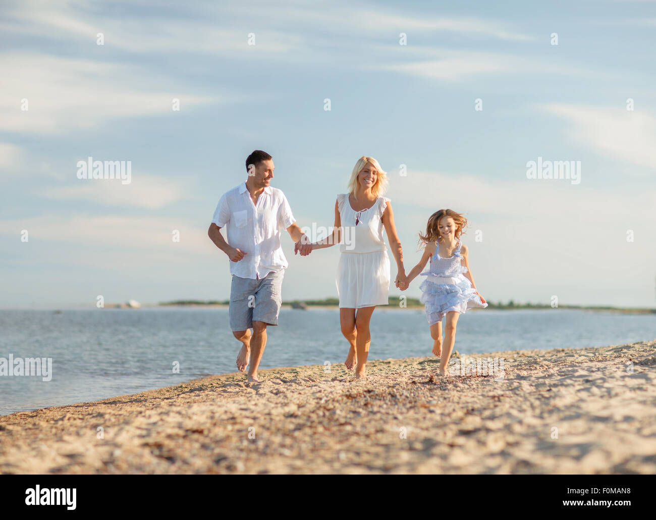 happy family at the seaside Stock Photo - Alamy
