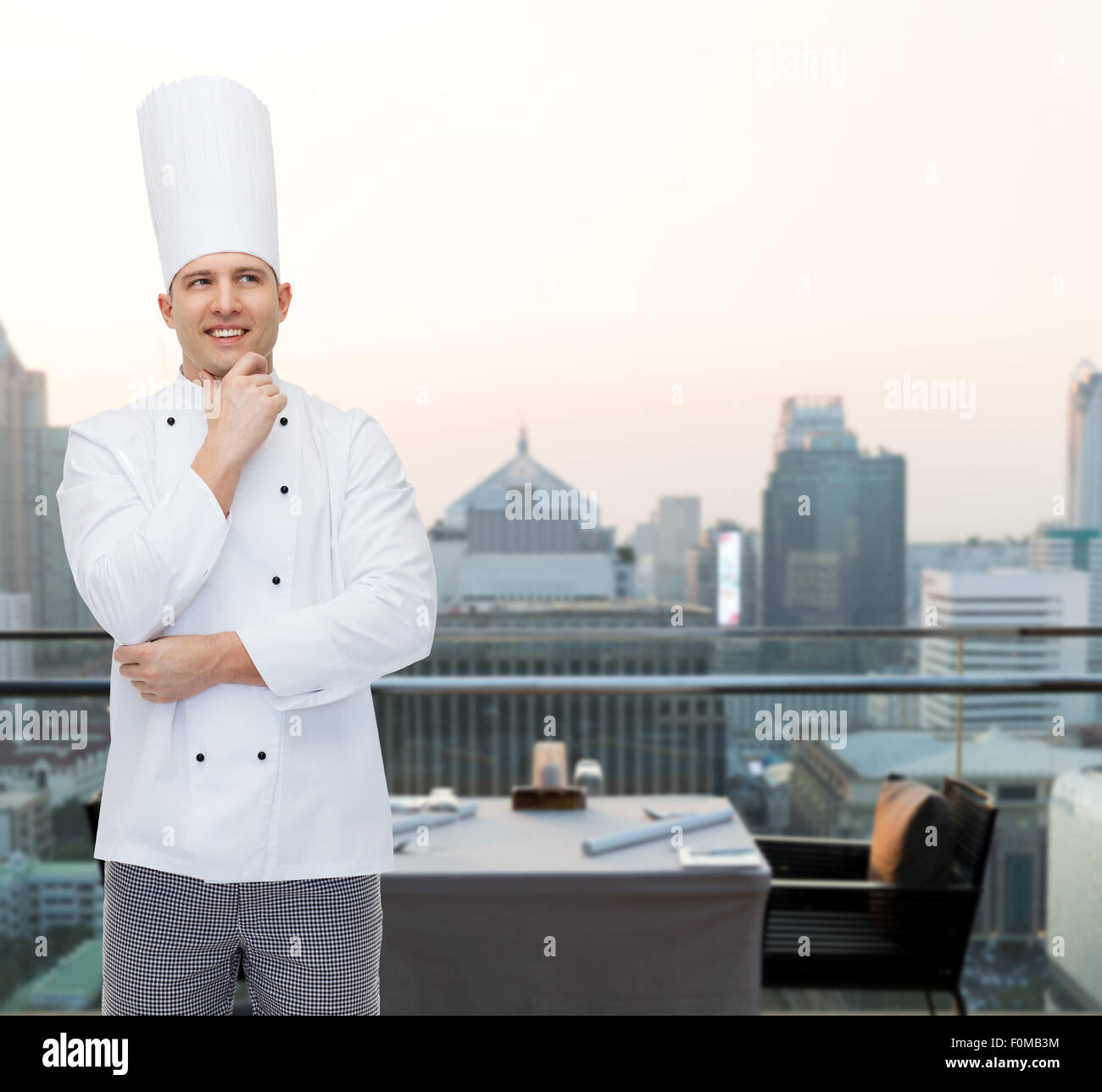 happy male chef cook thinking Stock Photo - Alamy