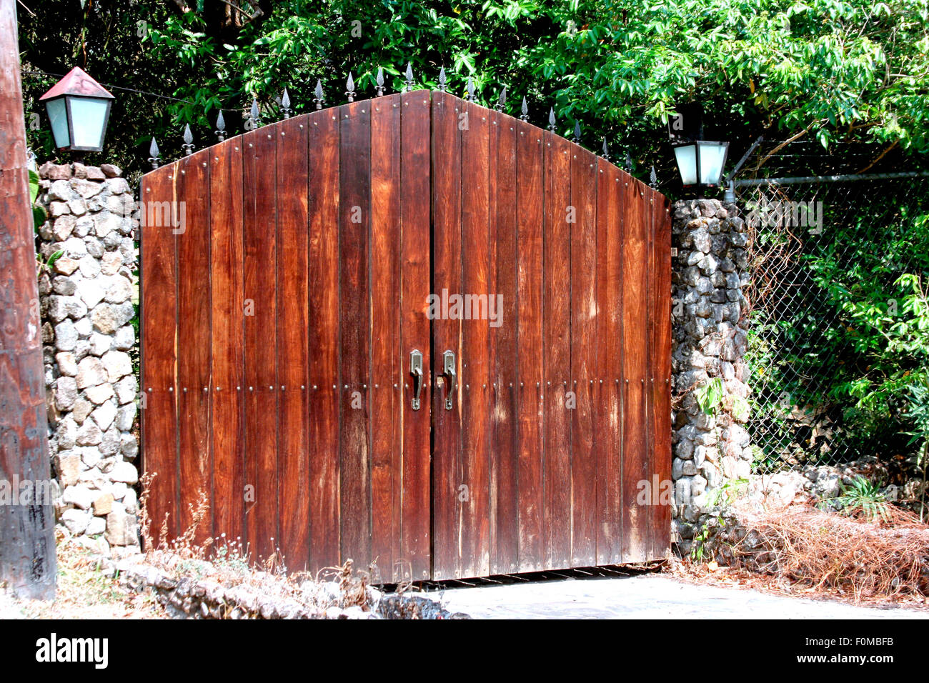Wooden front gate of a private propery Stock Photo - Alamy