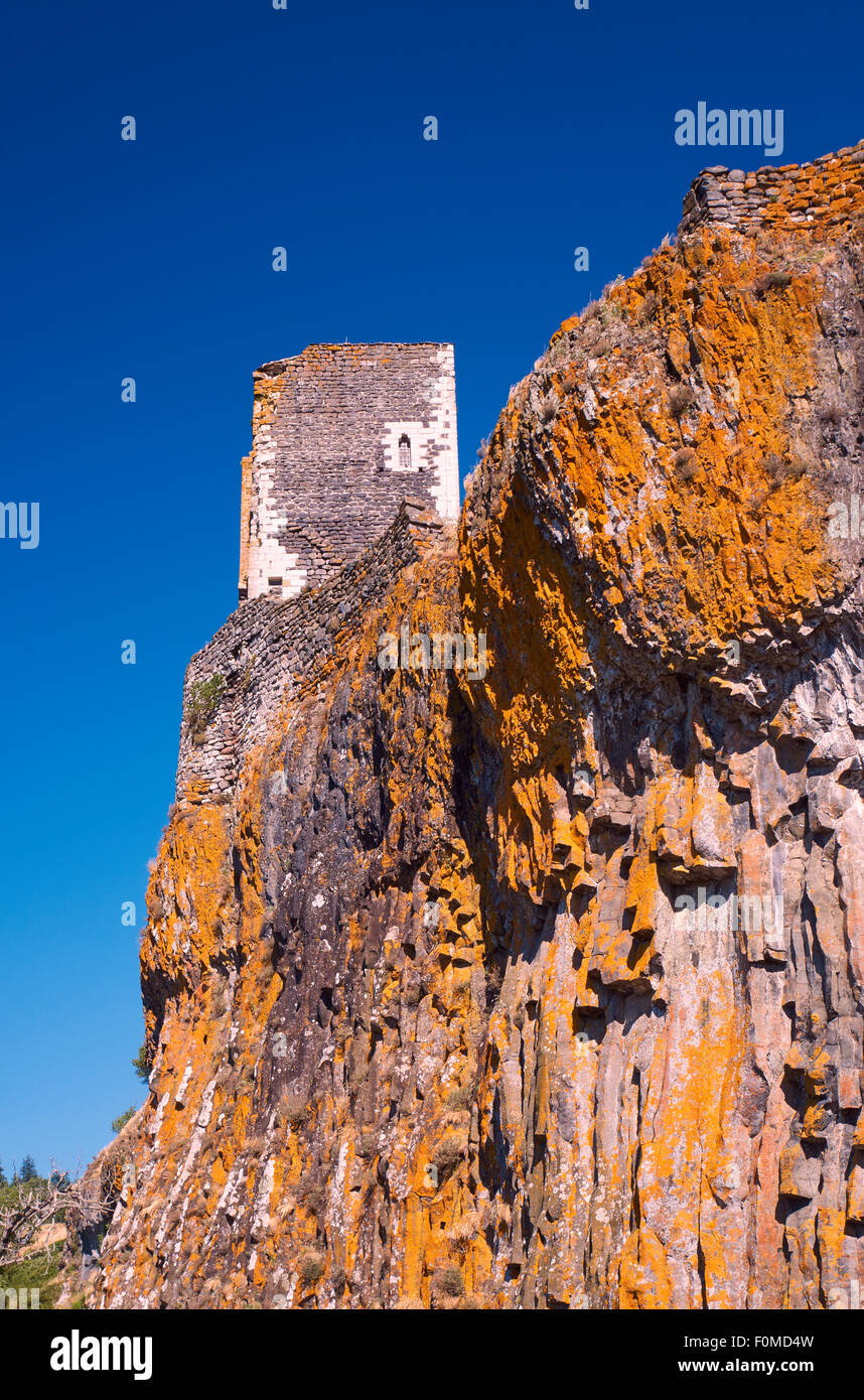 The ruins of the tower of a medieval castle on a rock in France Stock ...