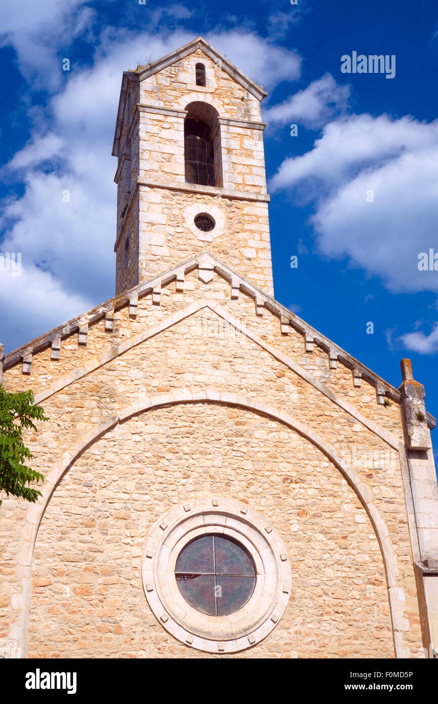 The stone bell tower of a medieval church in France Stock Photo - Alamy