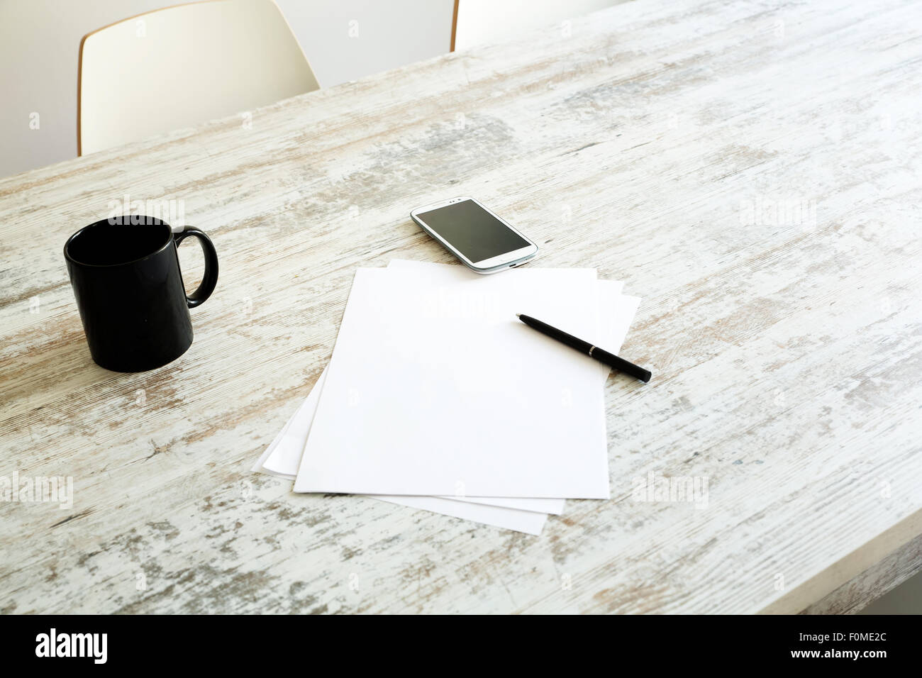 Brainstorming and taking notes at the table Stock Photo - Alamy