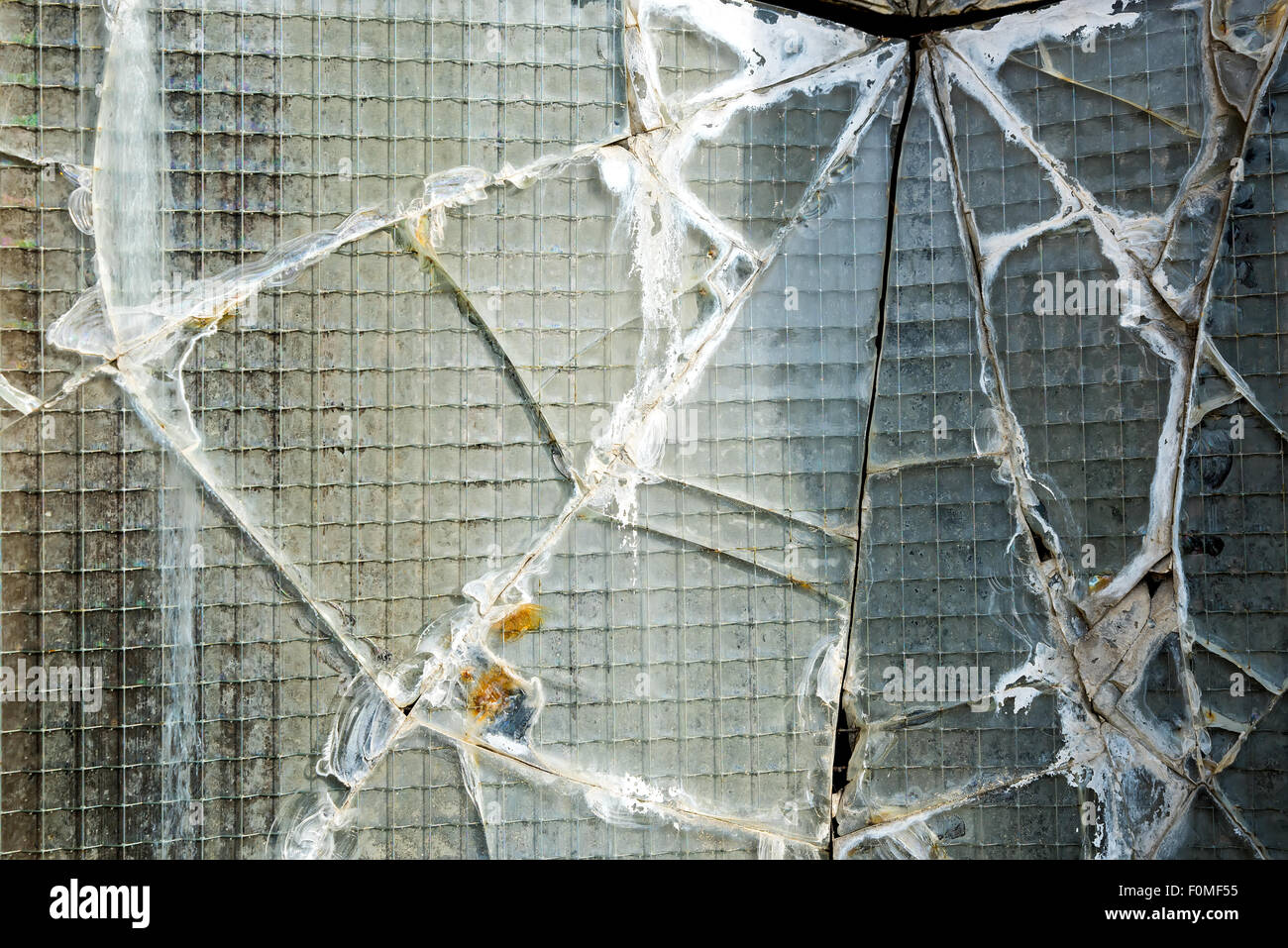 Shattered security glass Stock Photo - Alamy