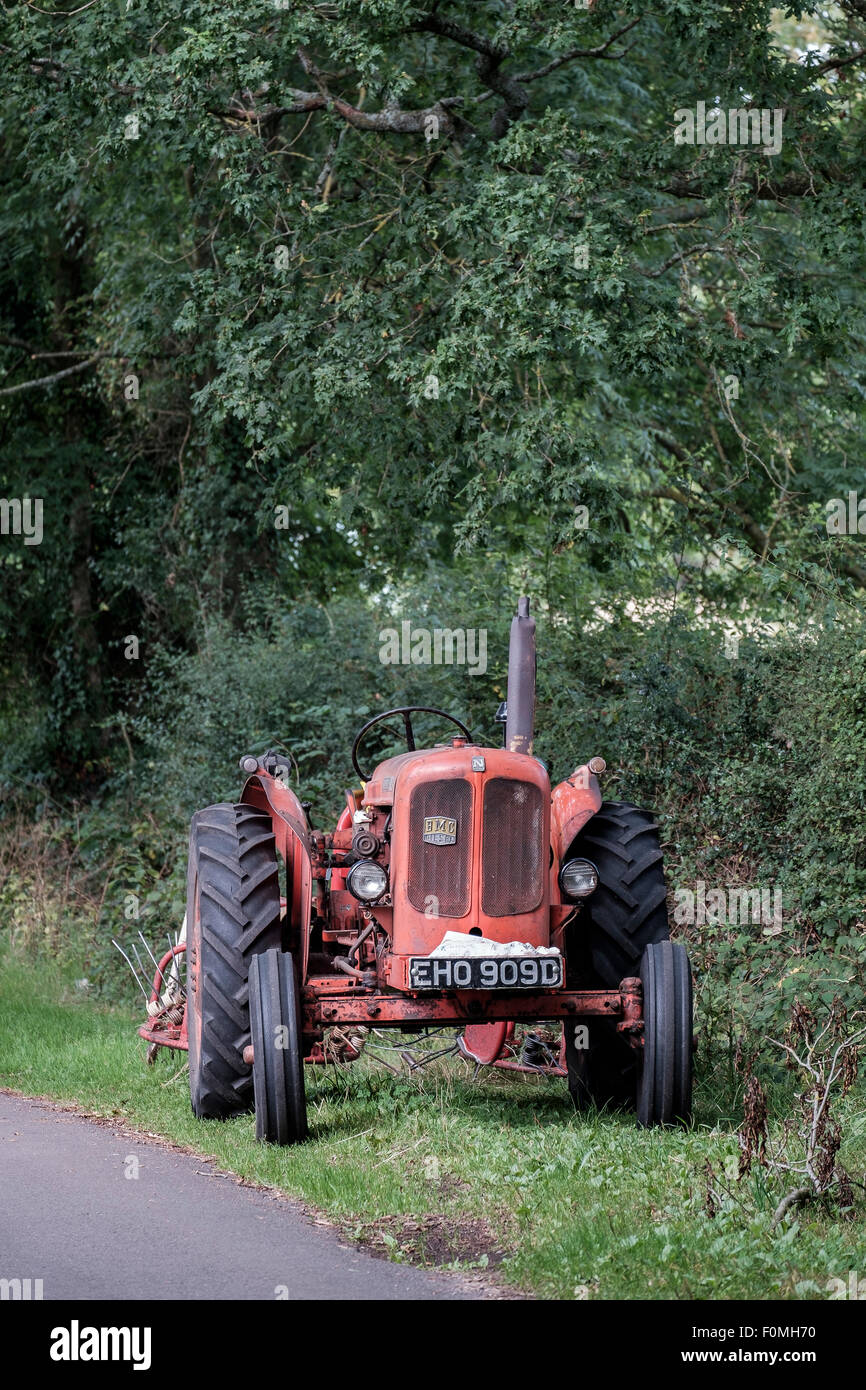 A vintage red BMC Nuffield /42 Tractor parked in a lane in the New ...