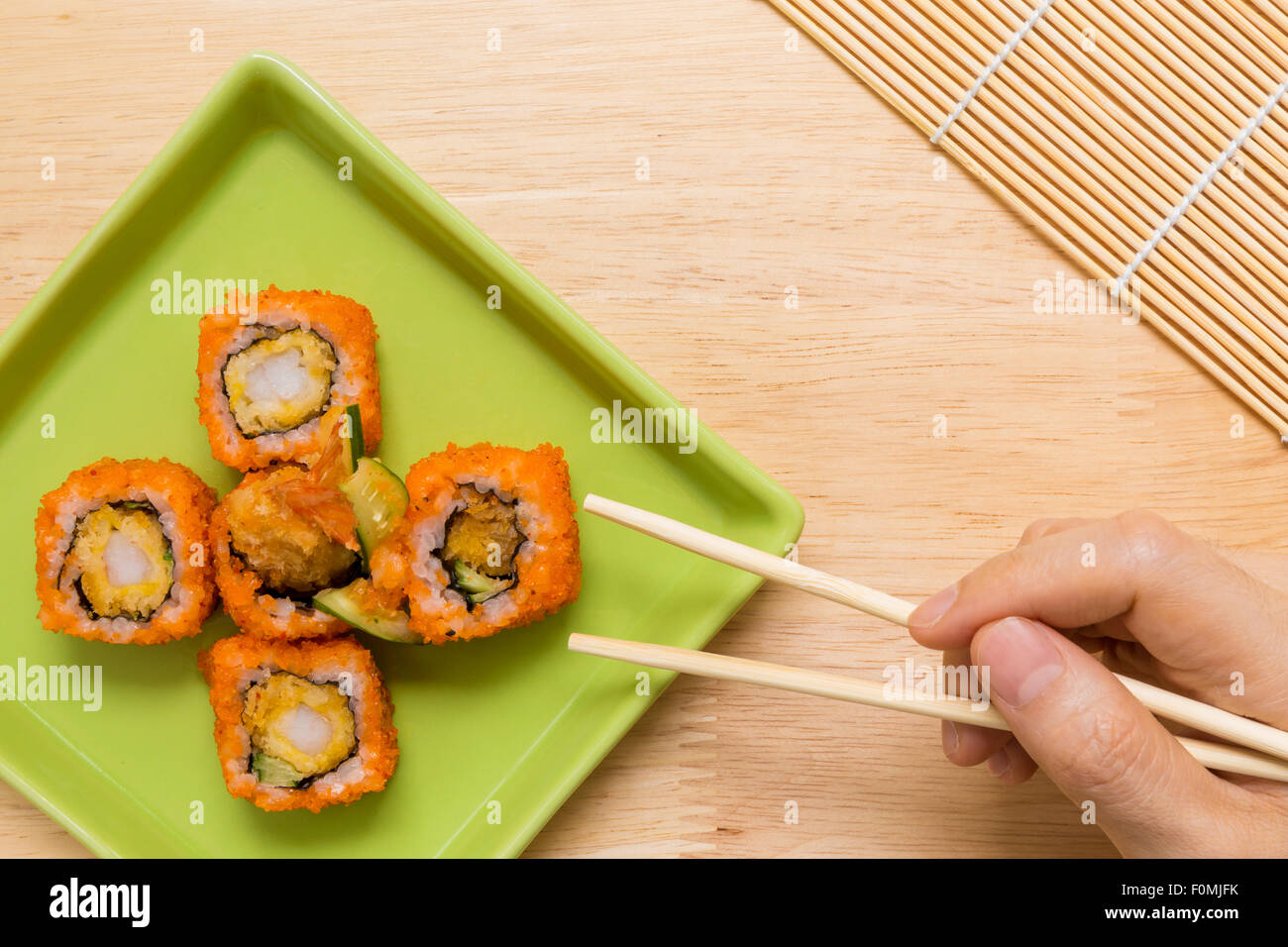 Traditional Japanese food, sushi roll, on wooden background Stock Photo ...