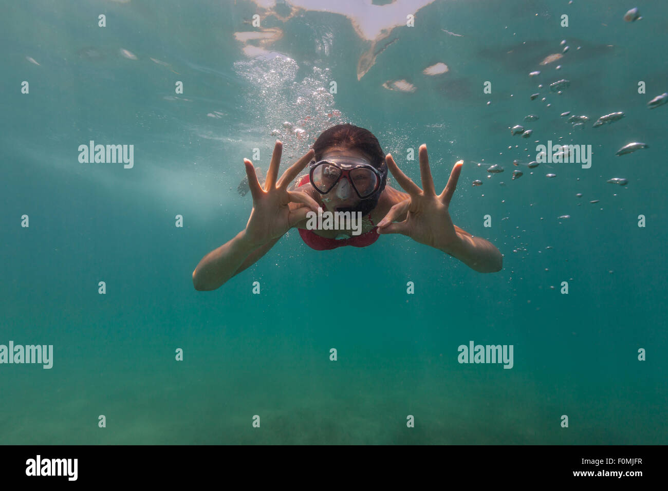 Freediver showing "ok" sign Stock Photo - Alamy