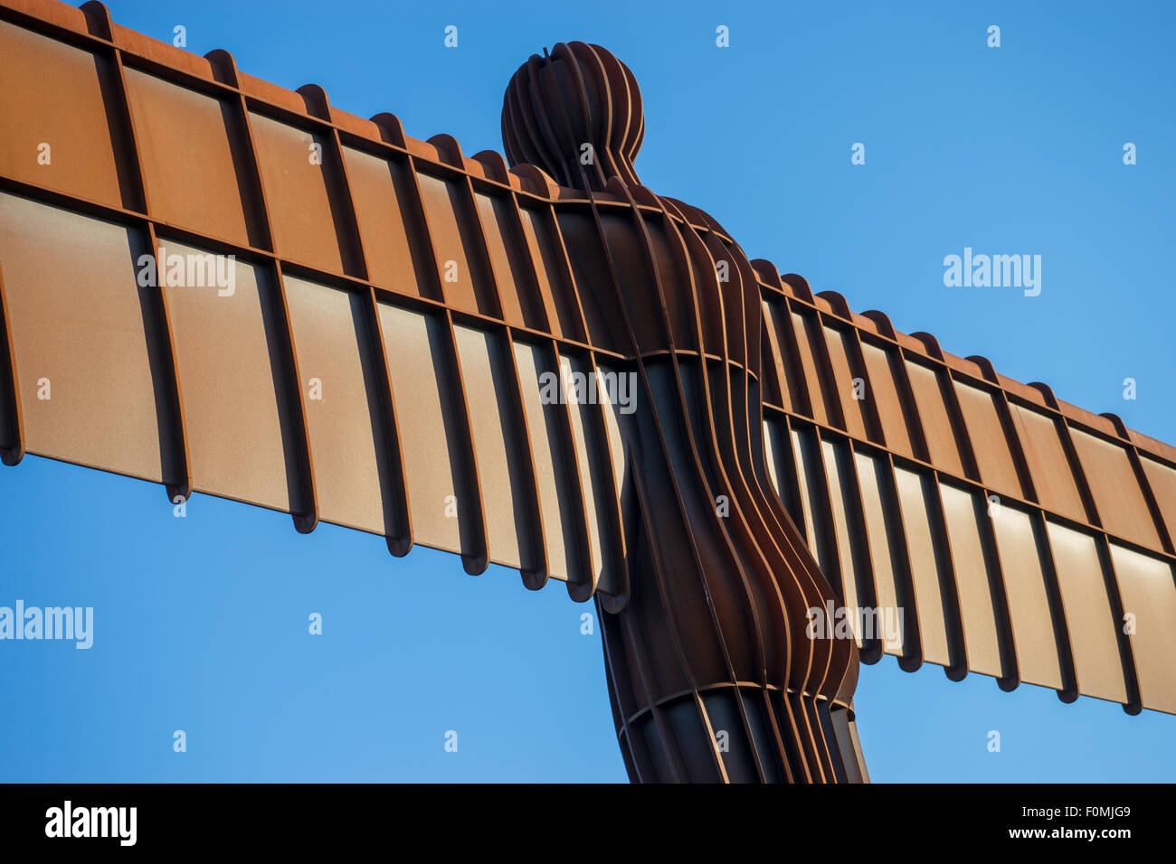 Looking up at the Angel of the North, Gateshead. The sky is blue Stock ...