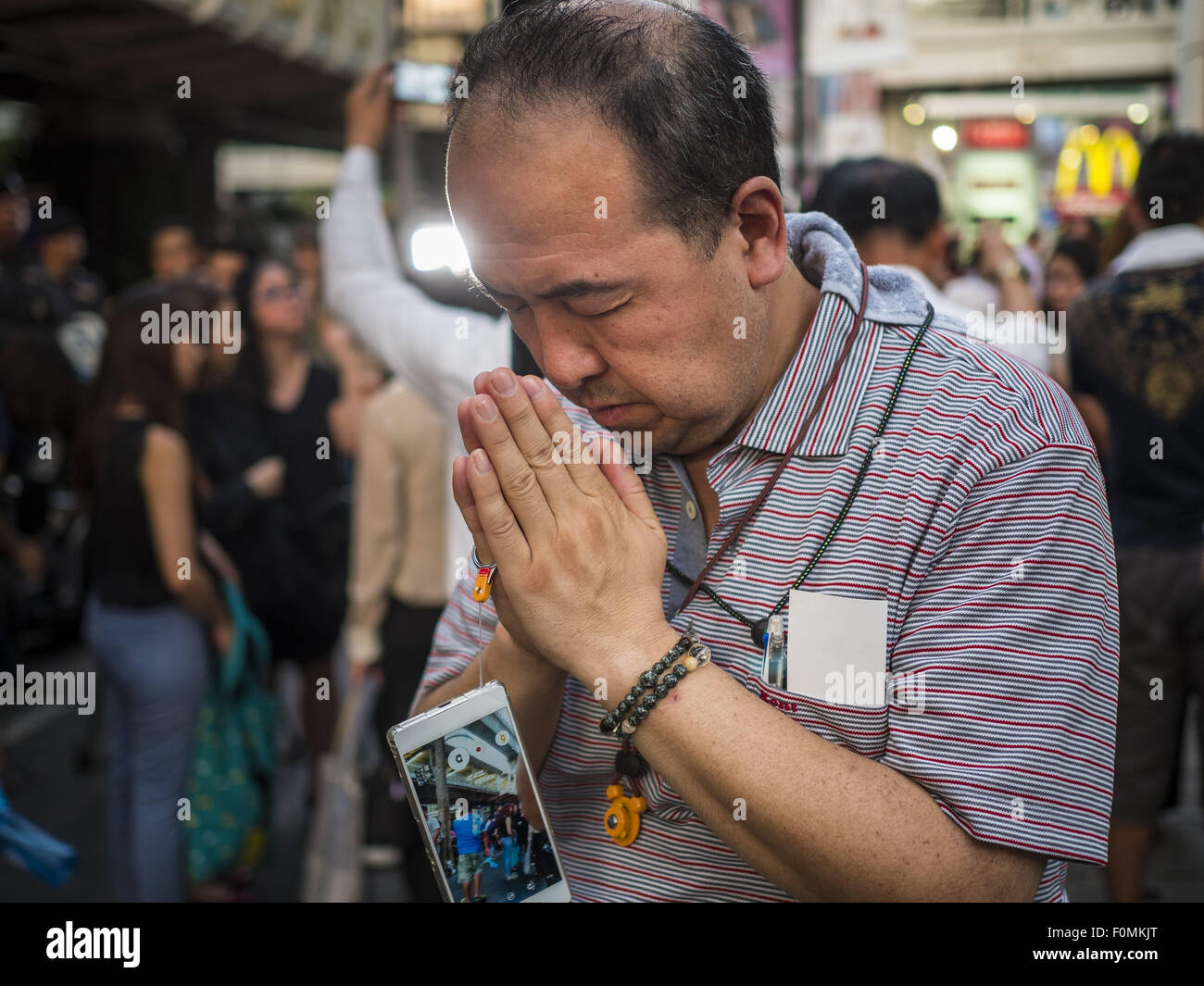 Man bows in prayer hi-res stock photography and images - Alamy