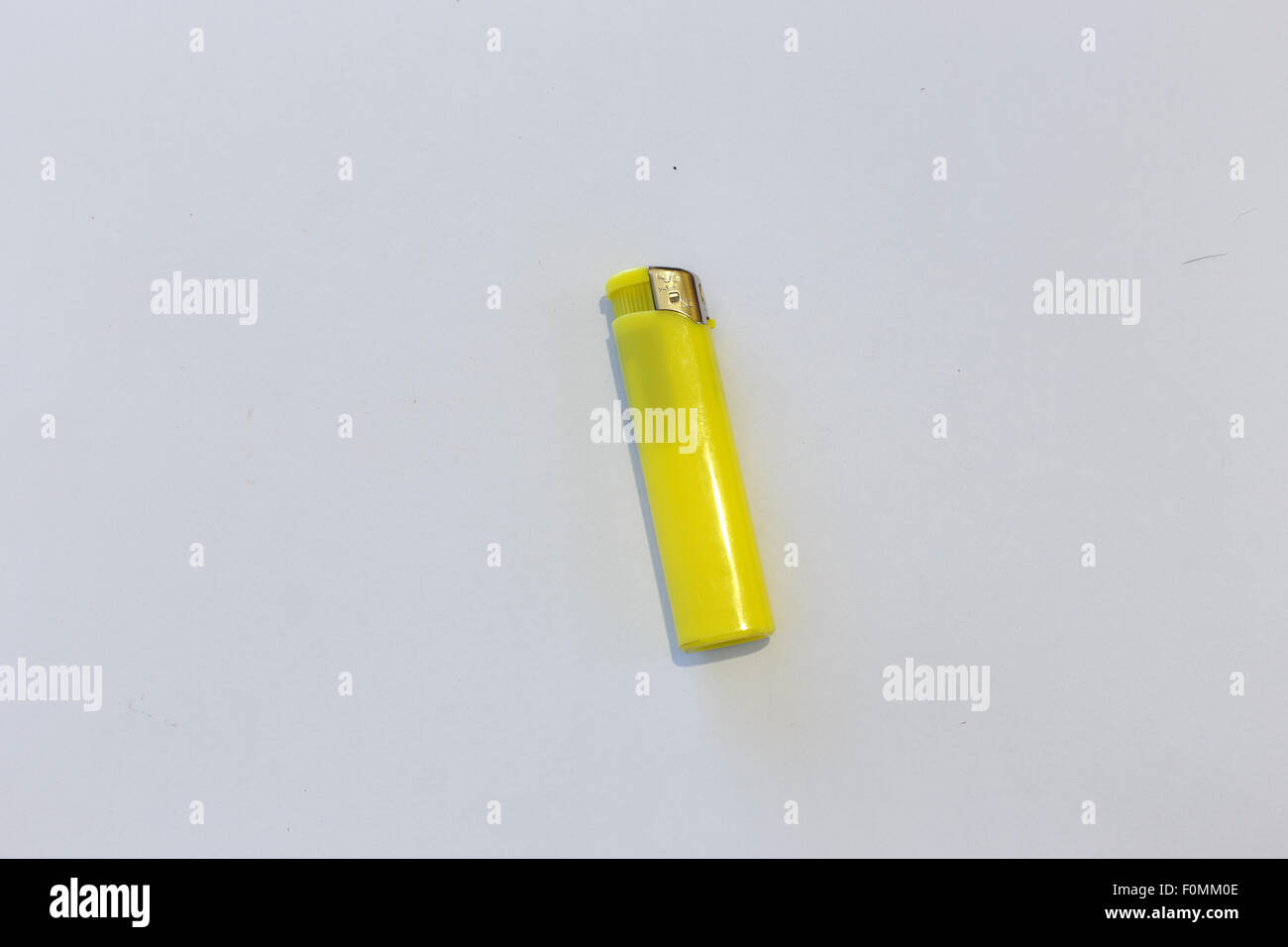 yellow Lighter isolated on white Stock Photo - Alamy
