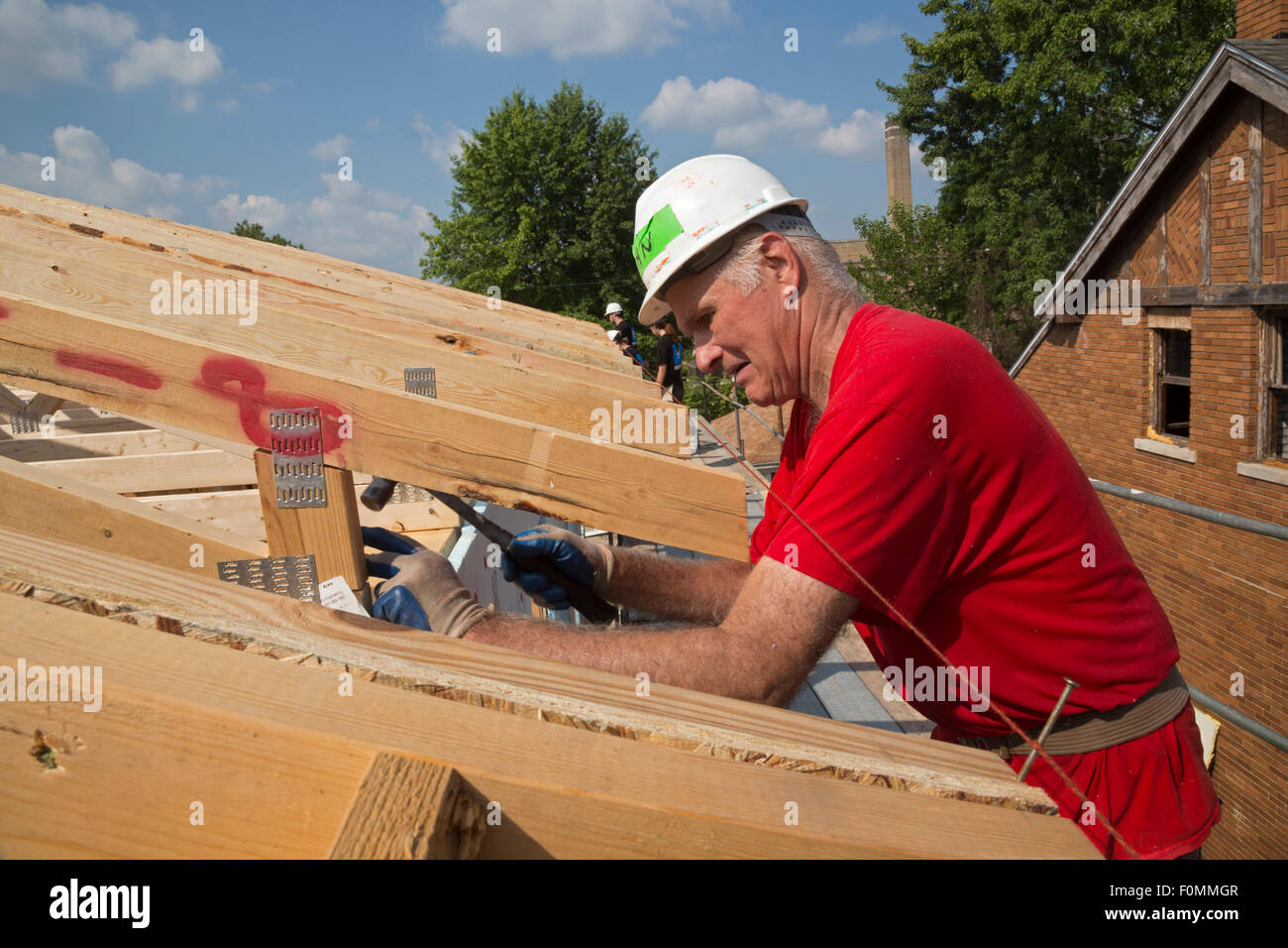 Detroit, Michigan - Habitat for Humanity volunteers build a house for a ...