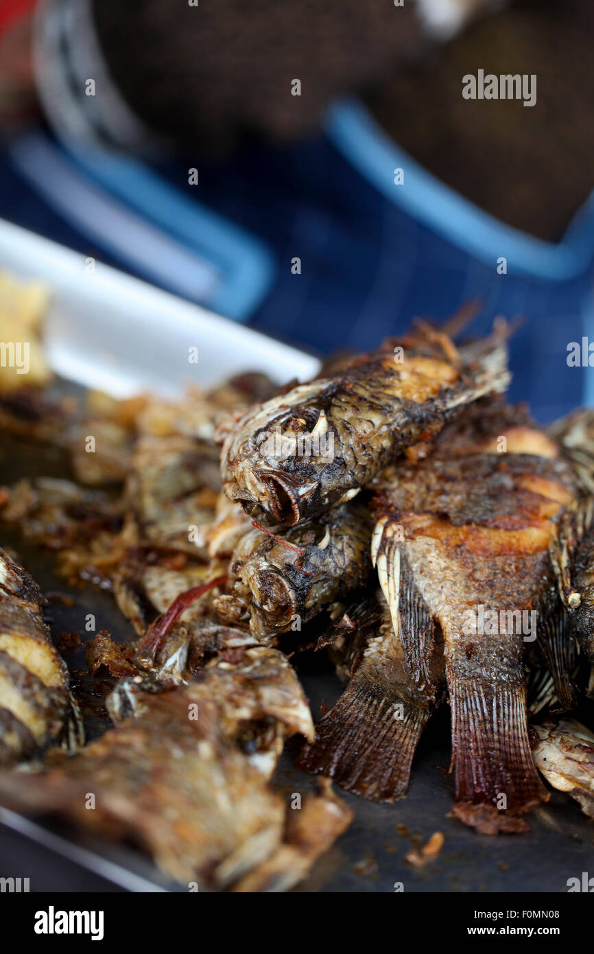 Fried fish at a food market in Ecuador Stock Photo - Alamy