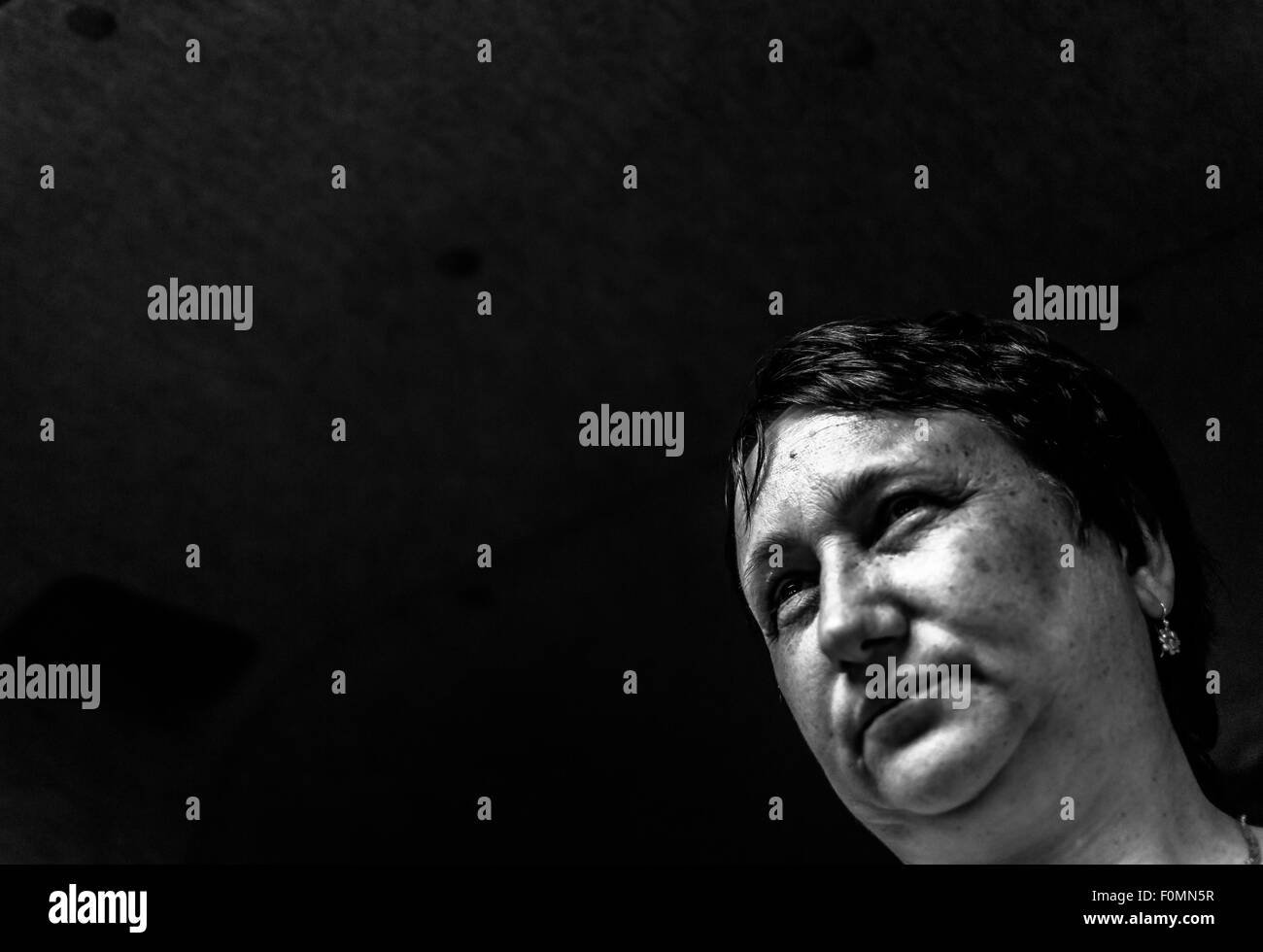 Woman dramatic portrait shadows fear hi-res stock photography and ...