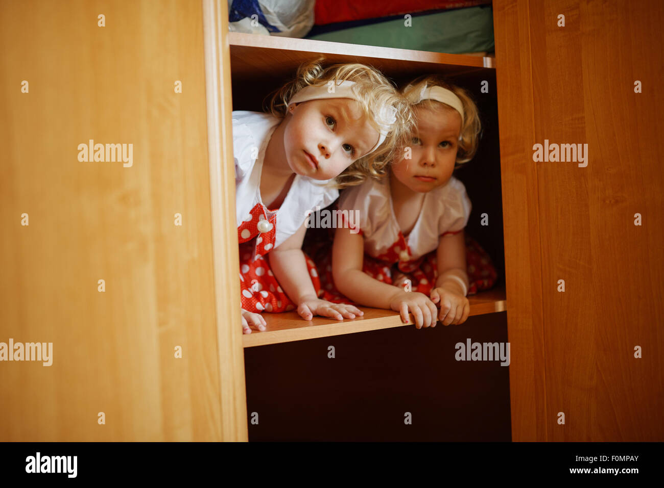two cute twin girls Stock Photo - Alamy
