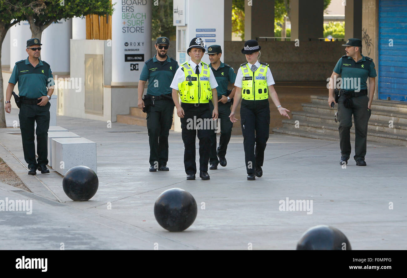 British officers in collaboration with spanish police patrol the ...