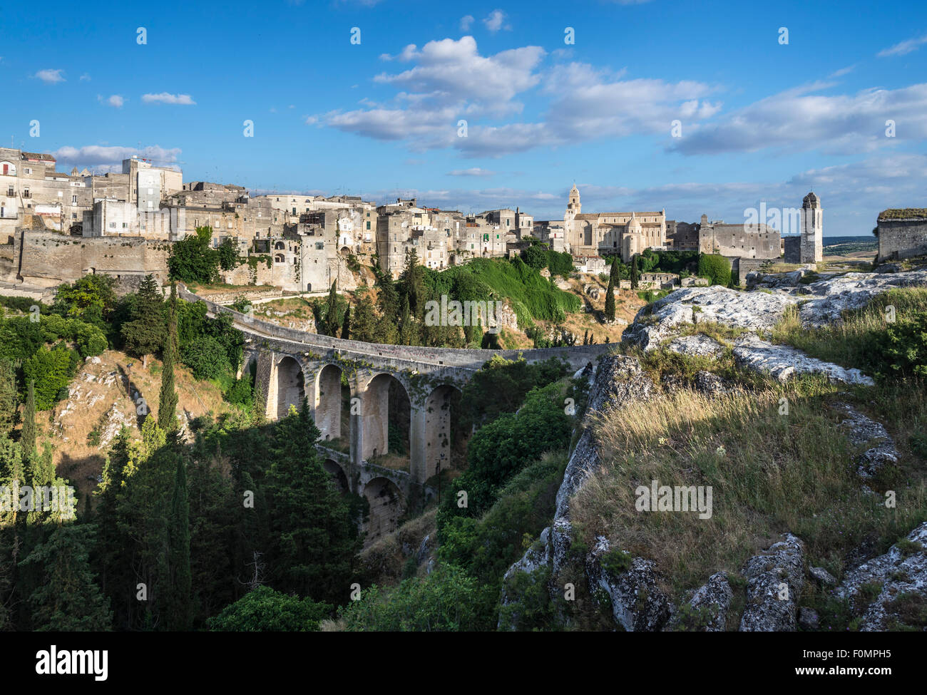 Looking across the gorge and rebuilt Roman bridge to the town of ...