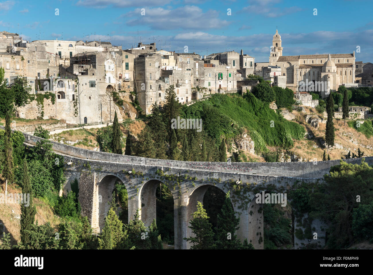 Looking across the gorge and rebuilt Roman bridge to the town of ...