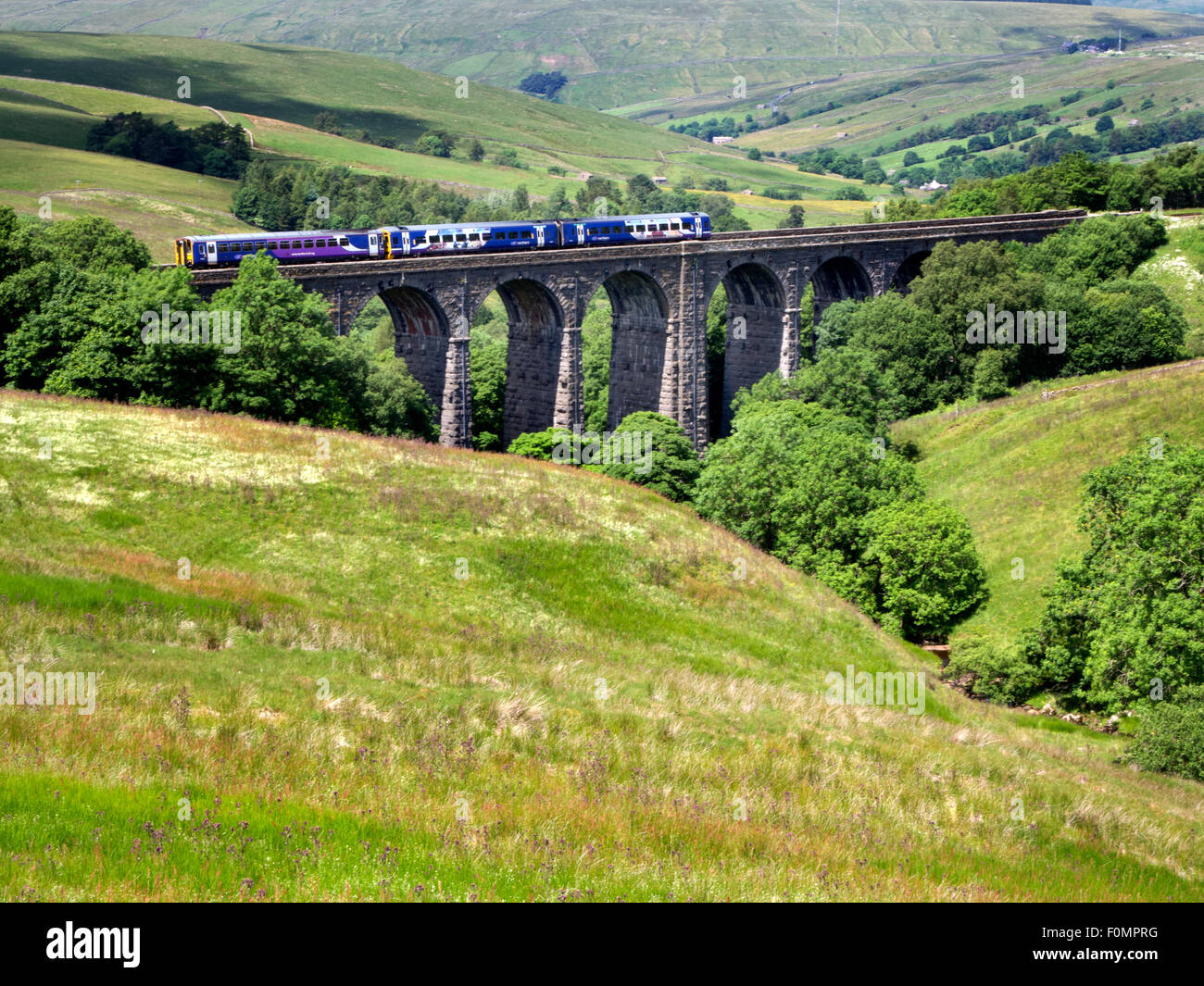 Northern train crossing railway viaduct hi-res stock photography and ...