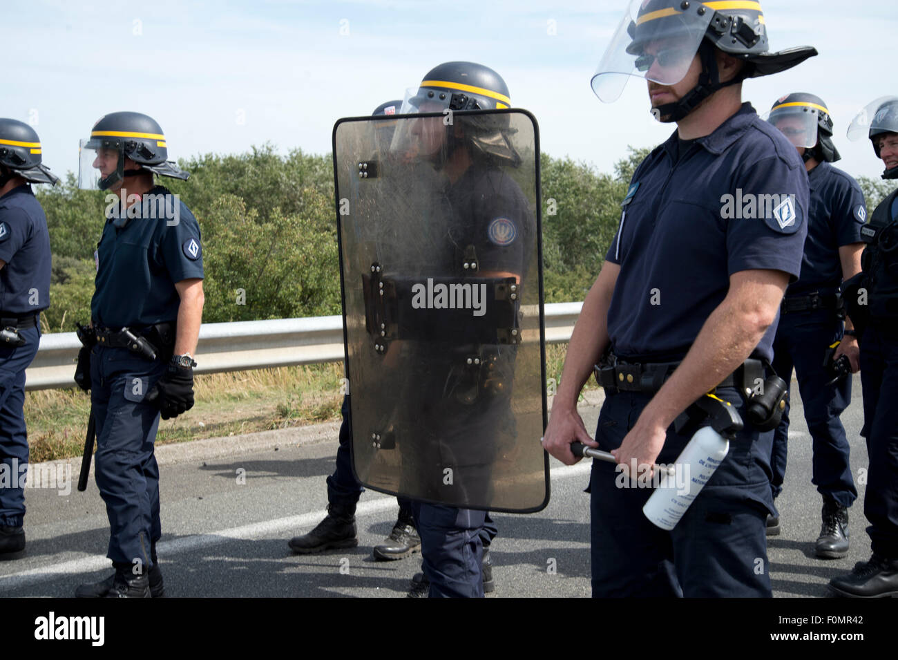 The 'Jungle', refugee camp . CRS police block the motorway approach to ...