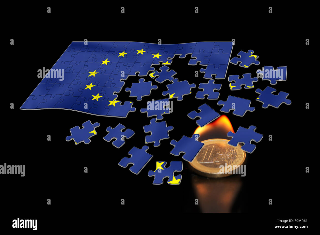 The euro sets fire to the EU cooperation puzzle Stock Photo - Alamy