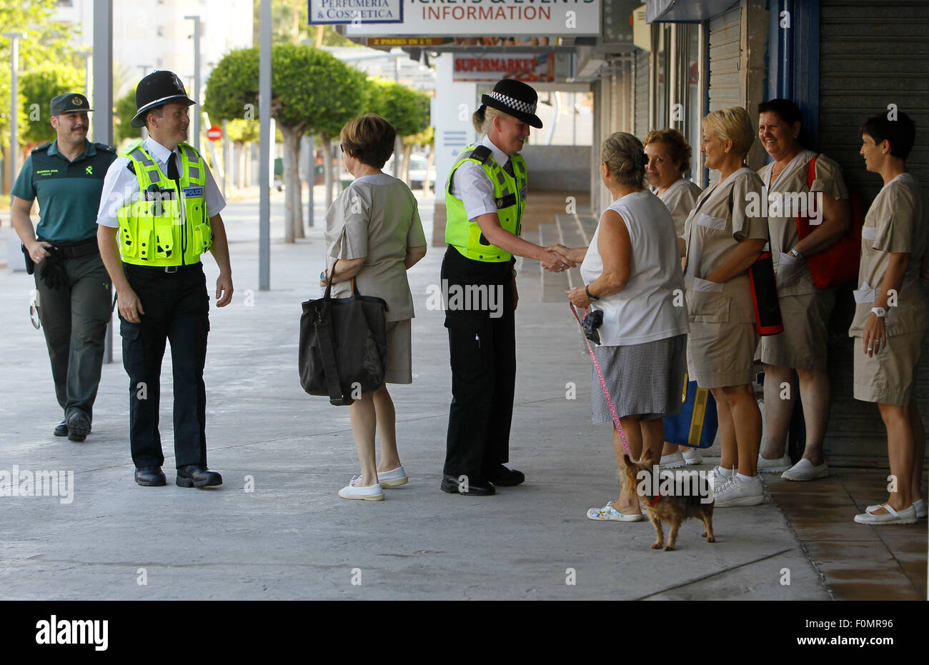 British officers in collaboration with spanish police patrol the ...