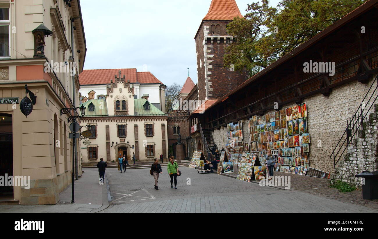 Paintings exhibition by various artists at Krakow's old ramparts Stock ...