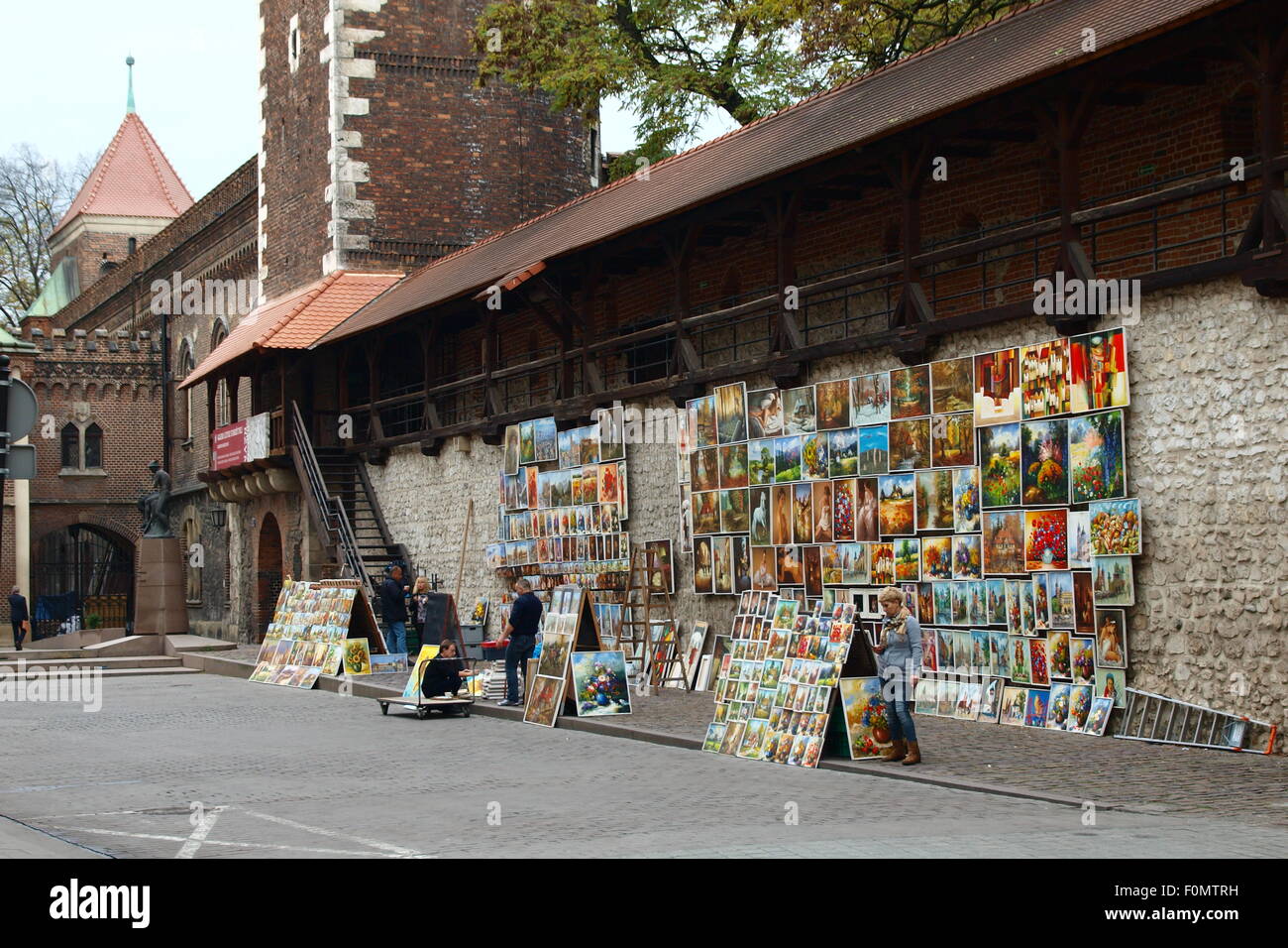 Paintings exhibition by various artists at Krakow's old ramparts Stock ...