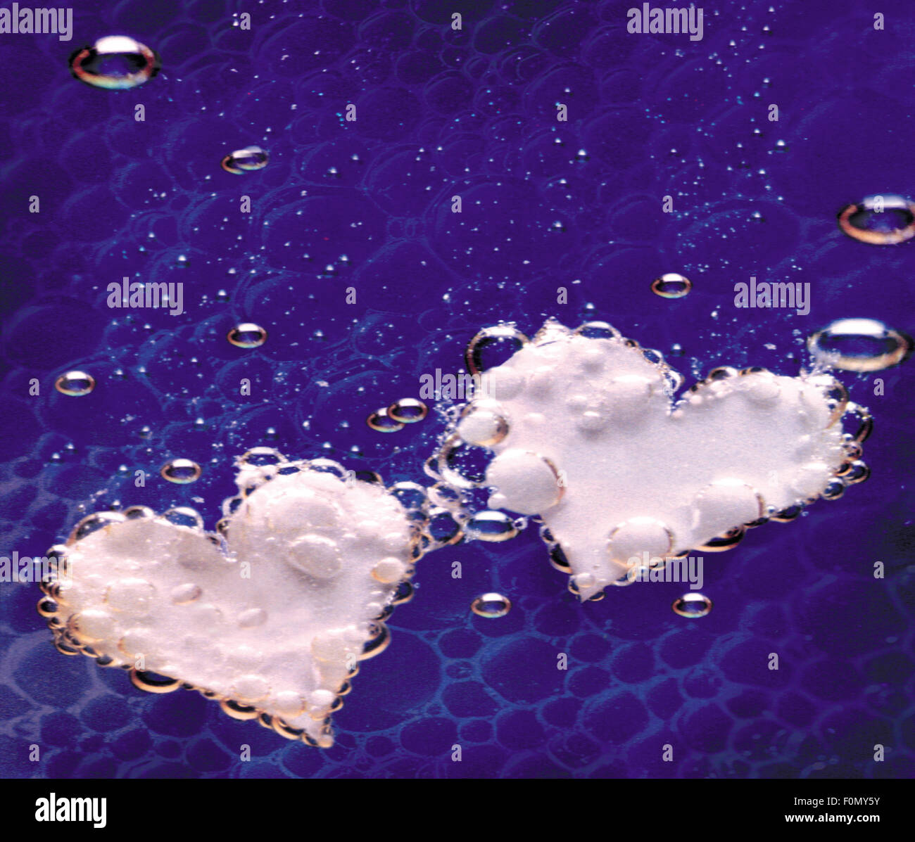 Illustration of two Love Pills bubbling in water background Stock Photo ...