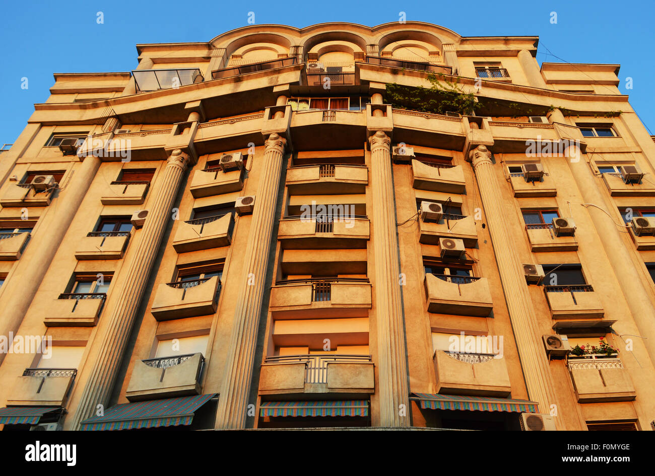 Evening sun on communist-era apartment block, Bucharest, Romania Stock ...