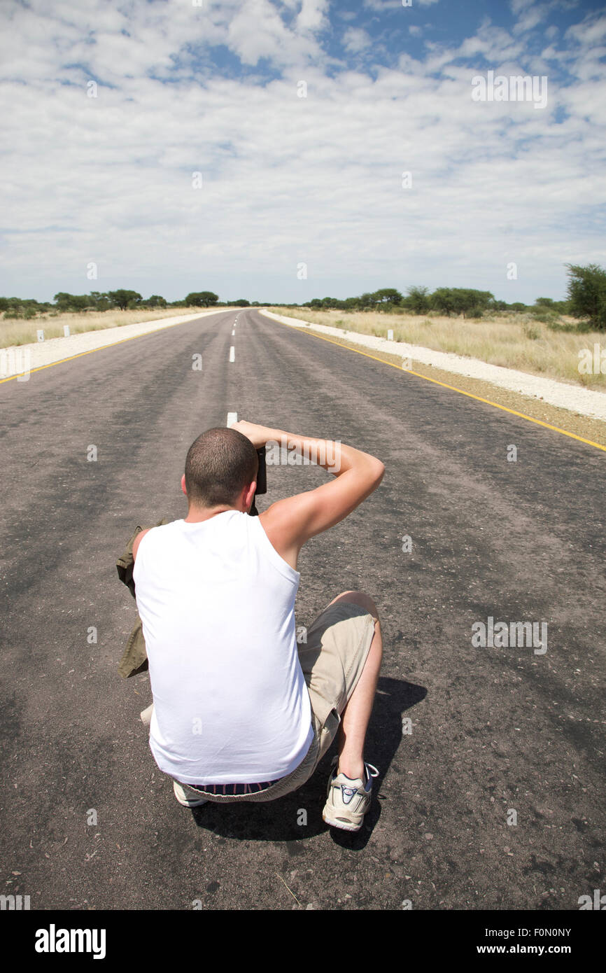 Photographer in action Stock Photo - Alamy