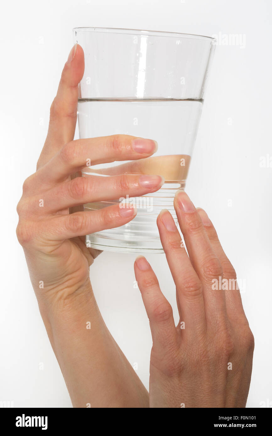 Woman hand with glass of water isolated on white background Stock Photo ...