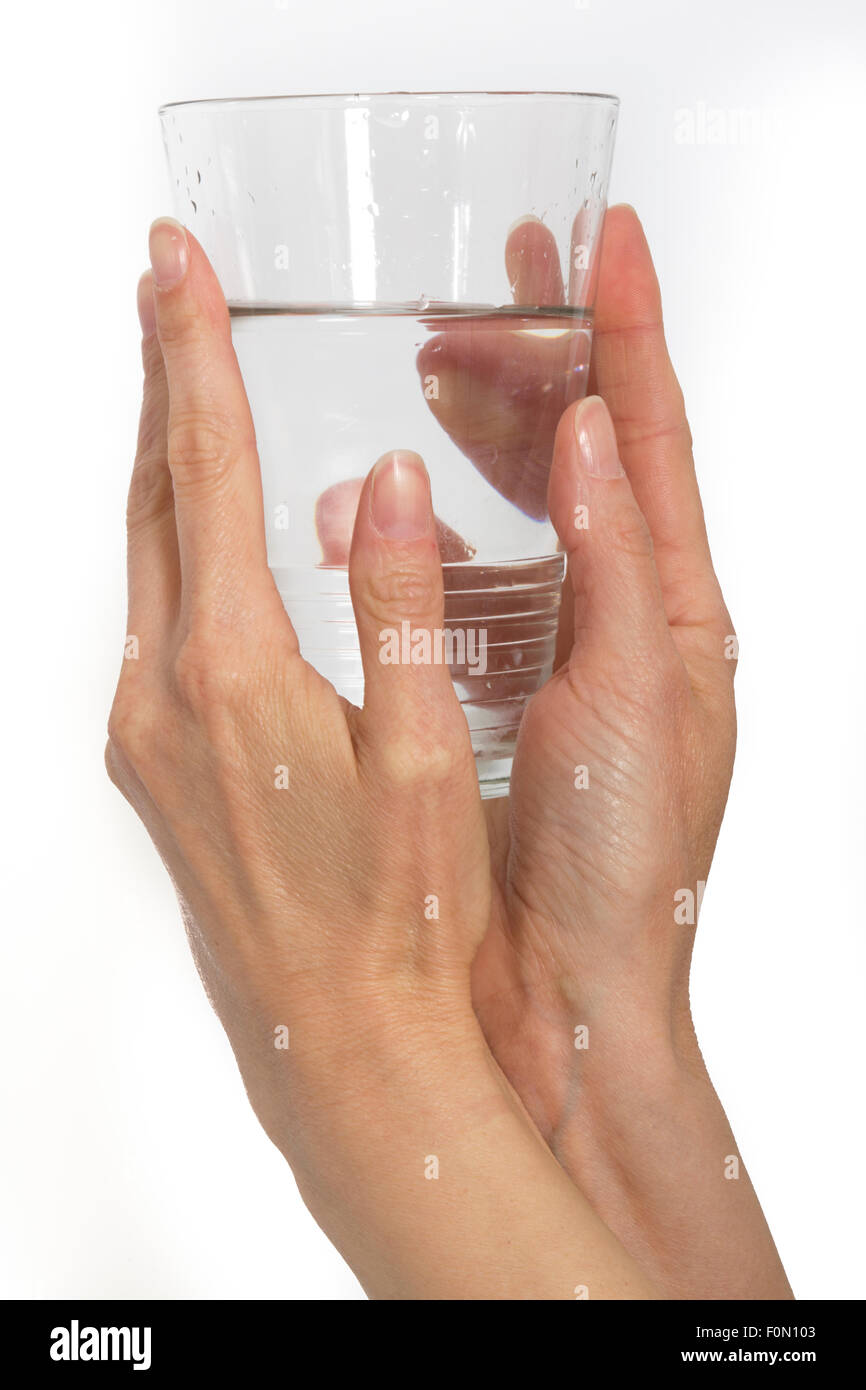 Woman hand with glass of water isolated on white background Stock Photo ...