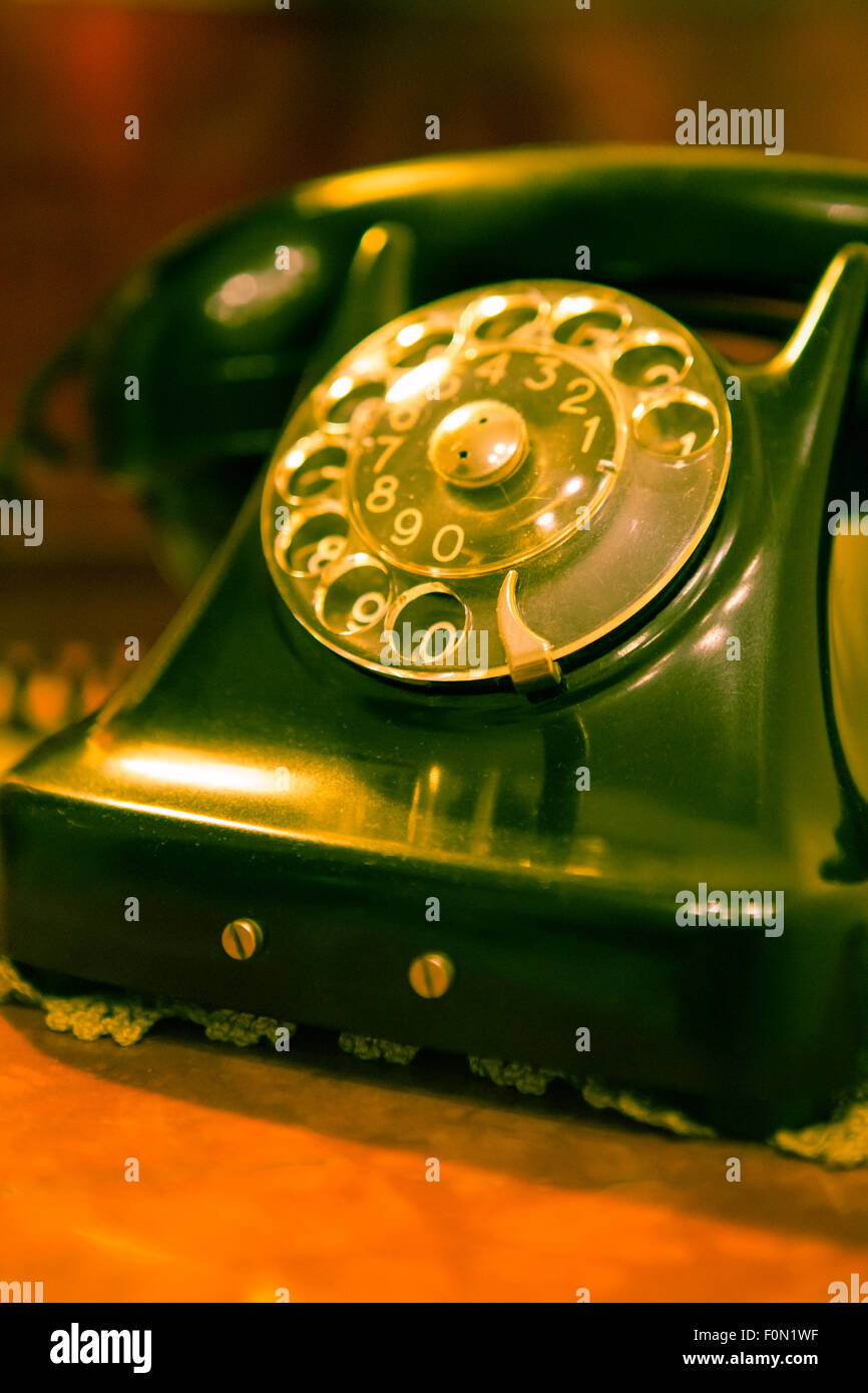 Old vintage green phone from the seventies with orange effect Stock ...