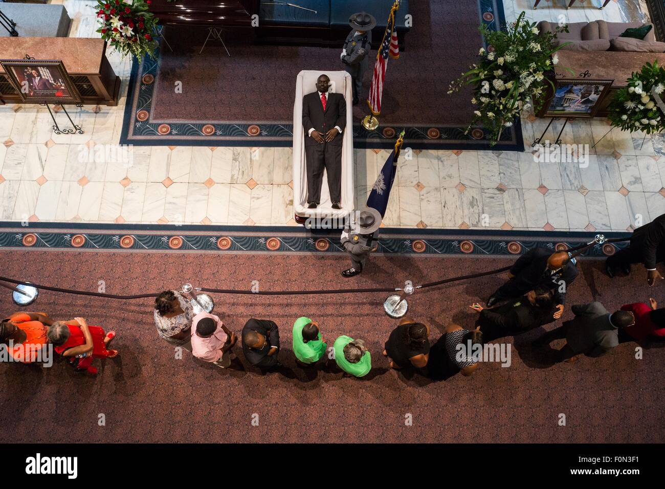 Mourners pause to view the body of slain State Senator Clementa ...
