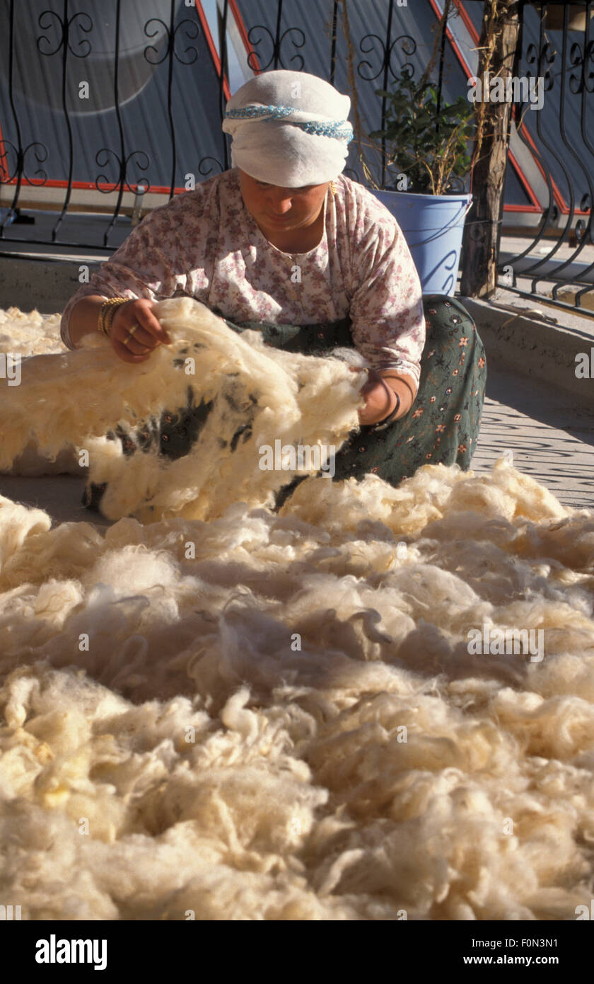 Woman sorting pure wool in Turkey Stock Photo - Alamy