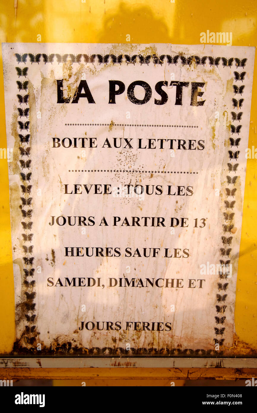 yellow antique post office information signboard Stock Photo - Alamy