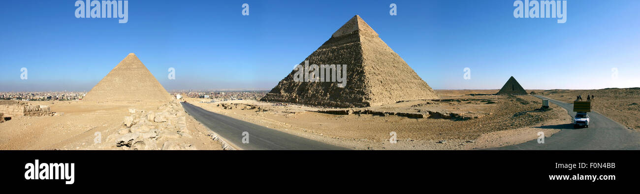 Panorama view of Giza pyramids with a blue sky Stock Photo - Alamy