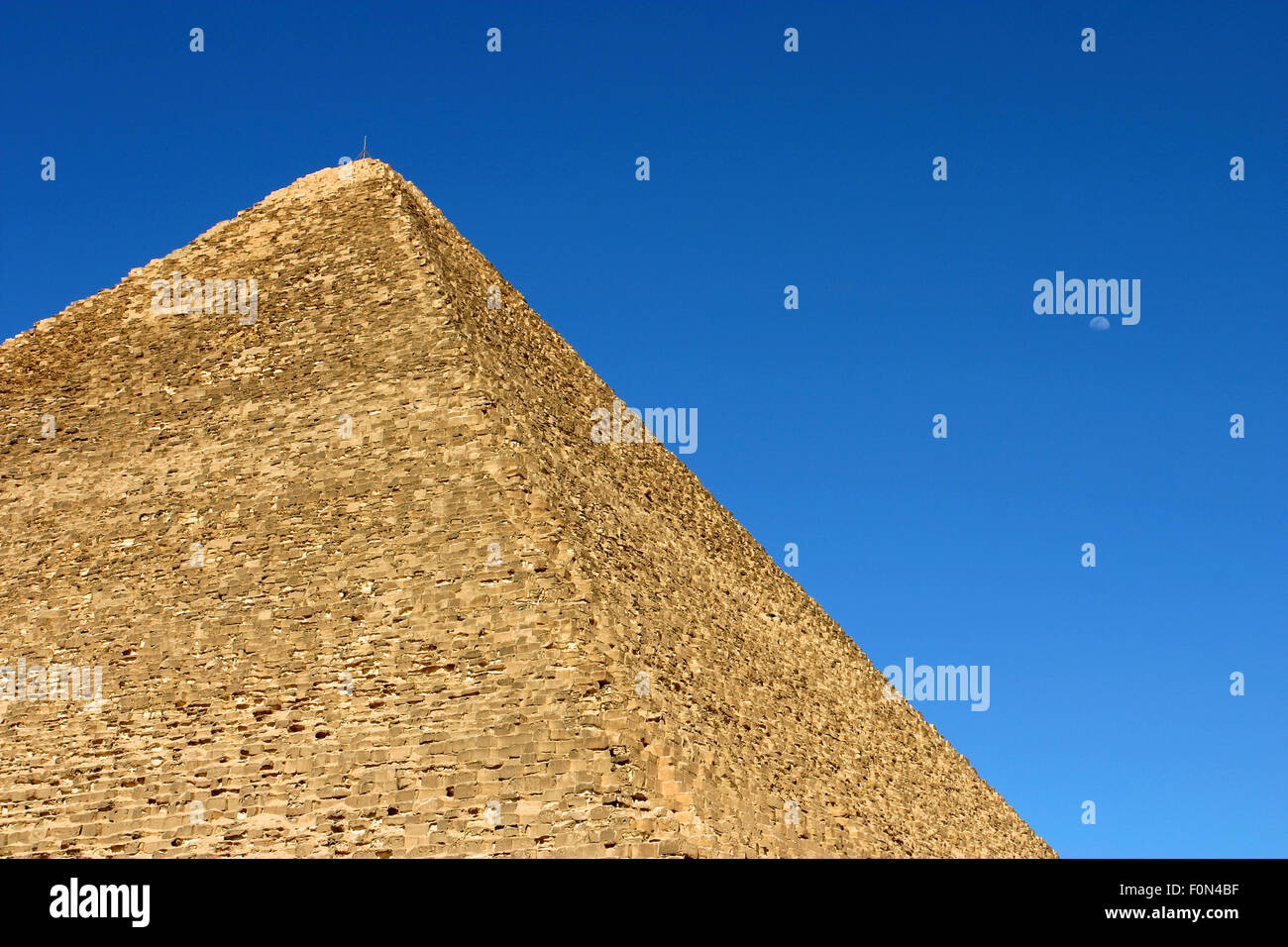 Detail of Great Pyramid of Giza with a clear blue sky in the background ...
